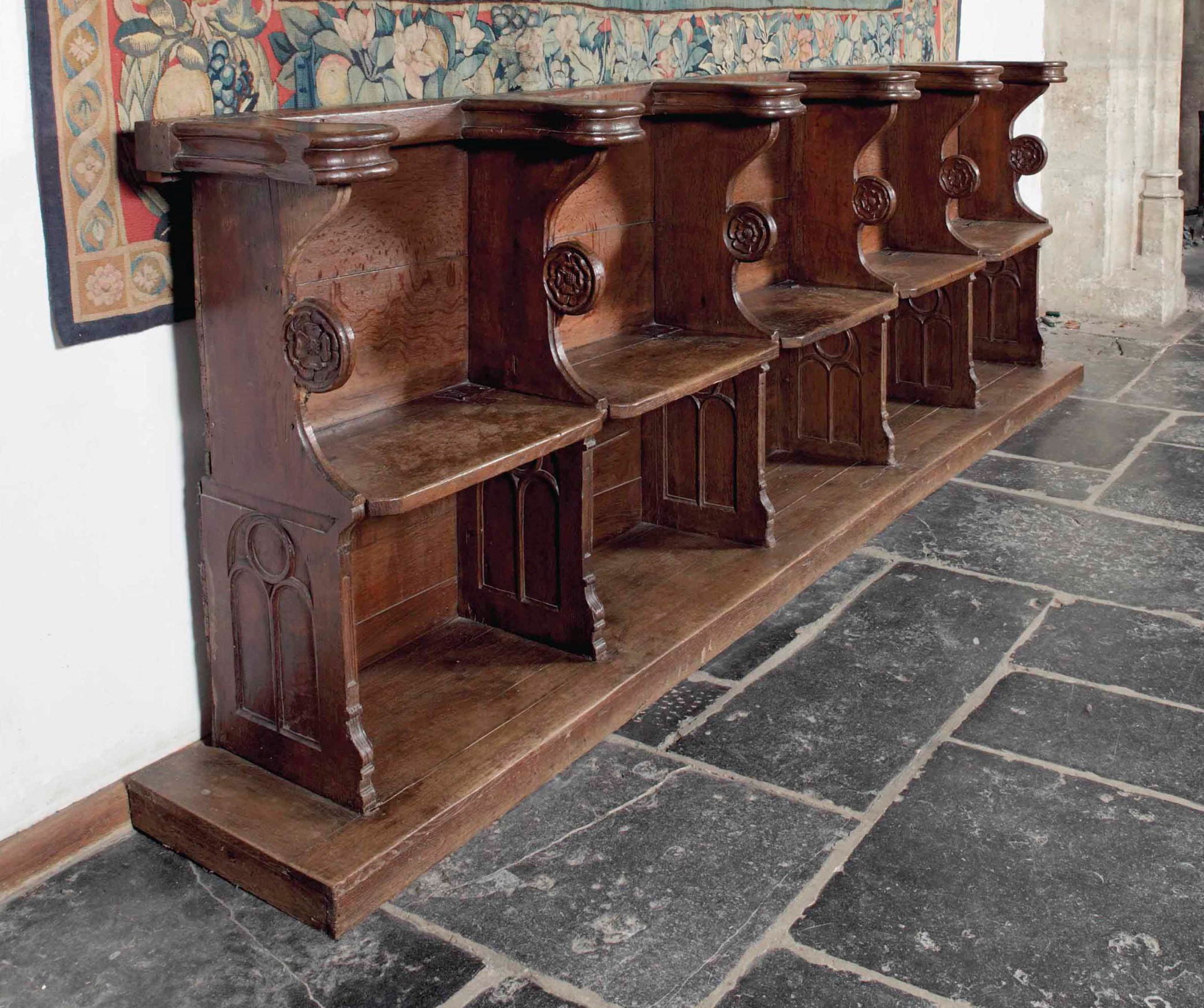 A North European oak choir bench , 16TH CENTURY | Christie's