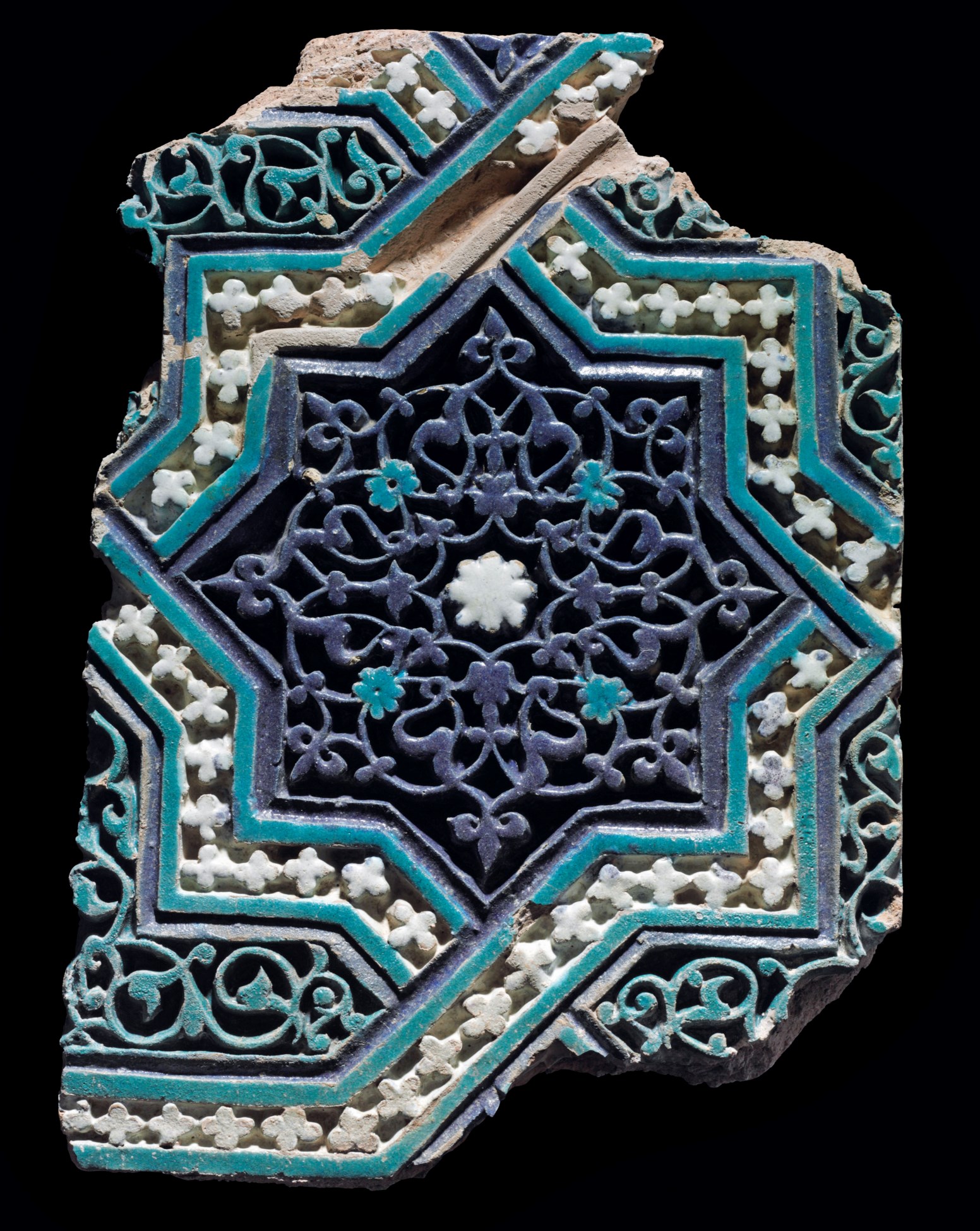 A TIMURID MOULDED POTTERY TILE PANEL , CENTRAL ASIA, LATE 14TH/EARLY ...