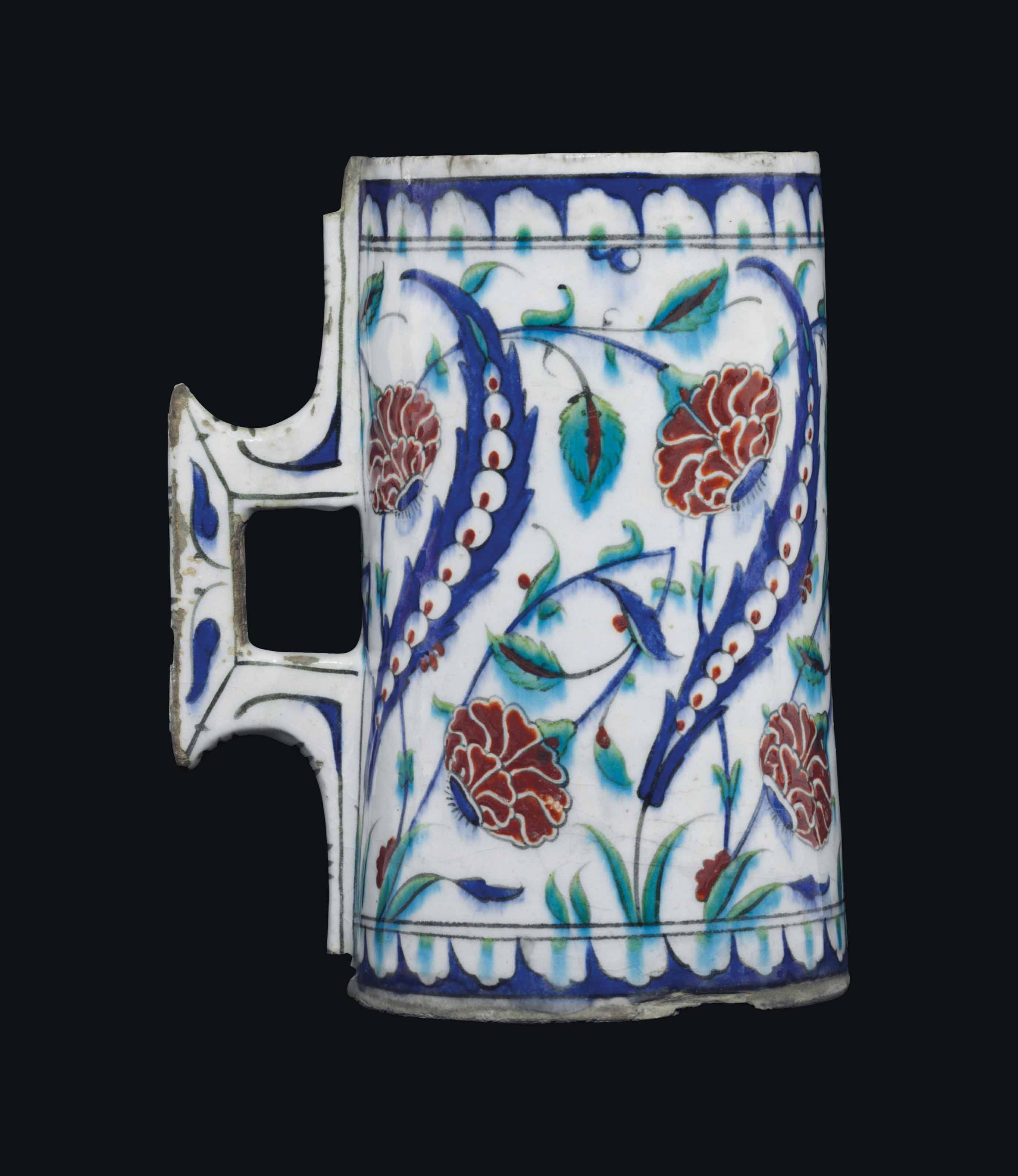 AN IZNIK POTTERY TANKARD , OTTOMAN TURKEY, CIRCA 1575 | Christie's