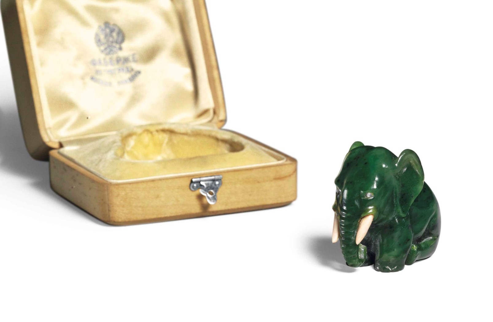 A NEPHRITE MODEL OF AN ELEPHANT , BY FABERGÉ, 1914-1917 | Christie's