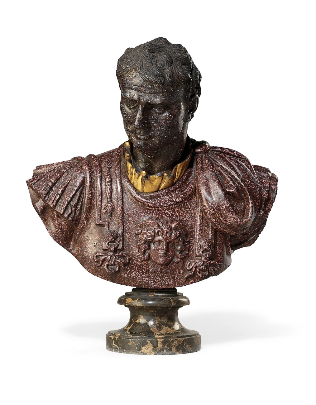 A CARVED PORPHYRY BUST OF A ROMAN CONSUL , ITALIAN, THE SHOULDERS 16TH ...