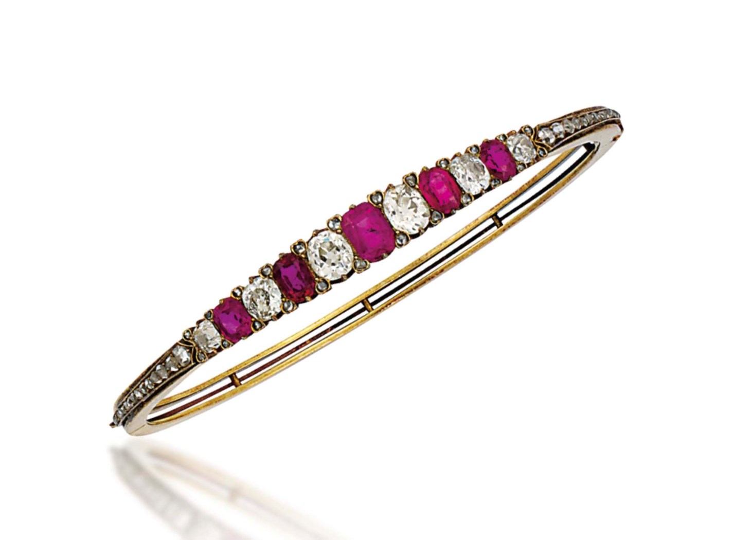 AN EARLY 20TH CENTURY RUBY AND DIAMOND DIADEM, AND A LATE 19TH CENTURY ...