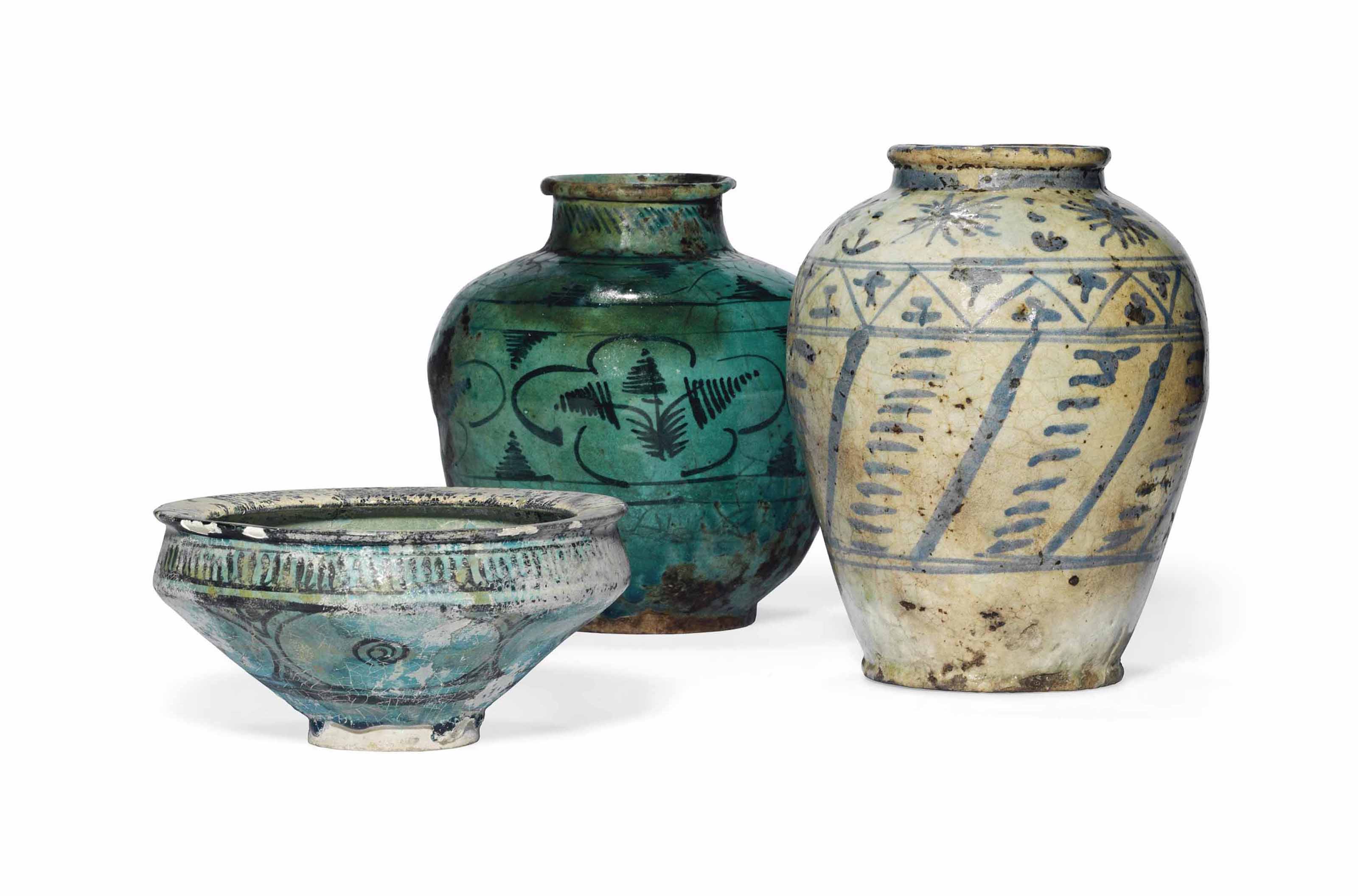 Two Islamic pottery vases and a Kashan bowl