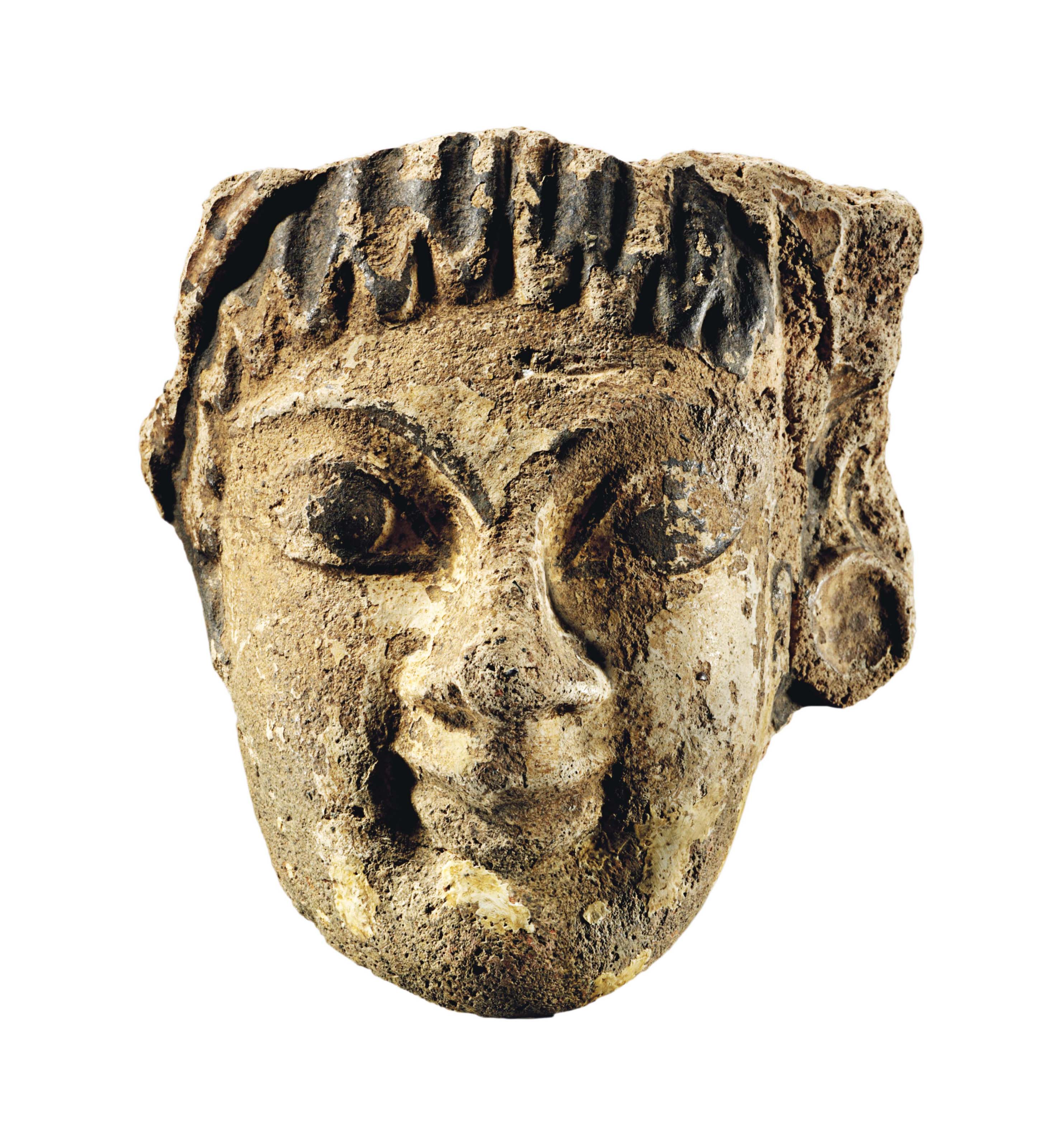 AN ETRUSCAN TERRACOTTA ANTEFIX