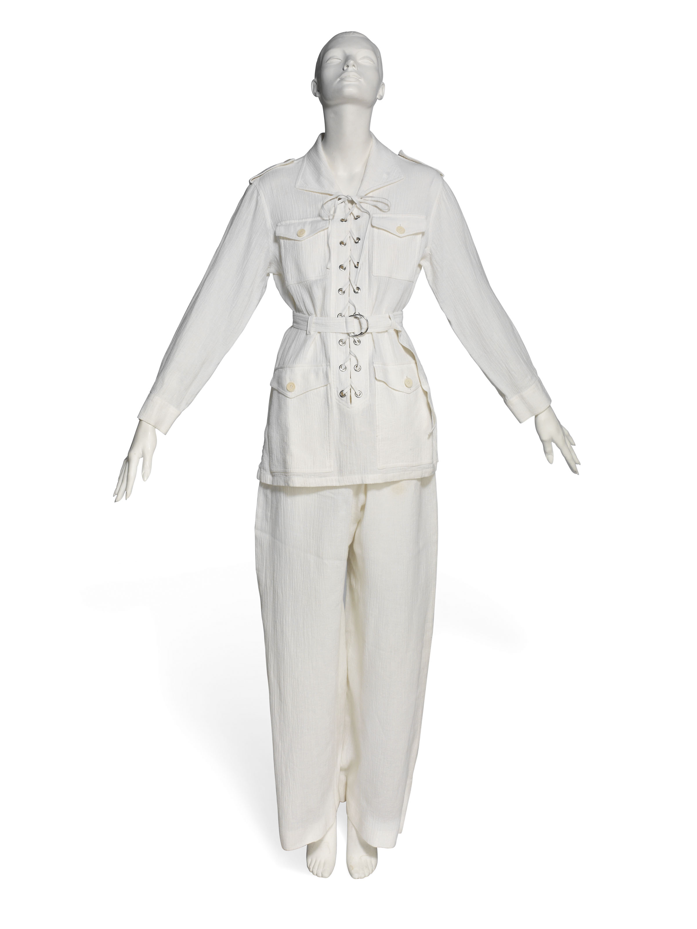 A WHITE LINEN GAUZE SAFARI-STYLE TROUSER SUIT, YVES SAINT LAURENT ...