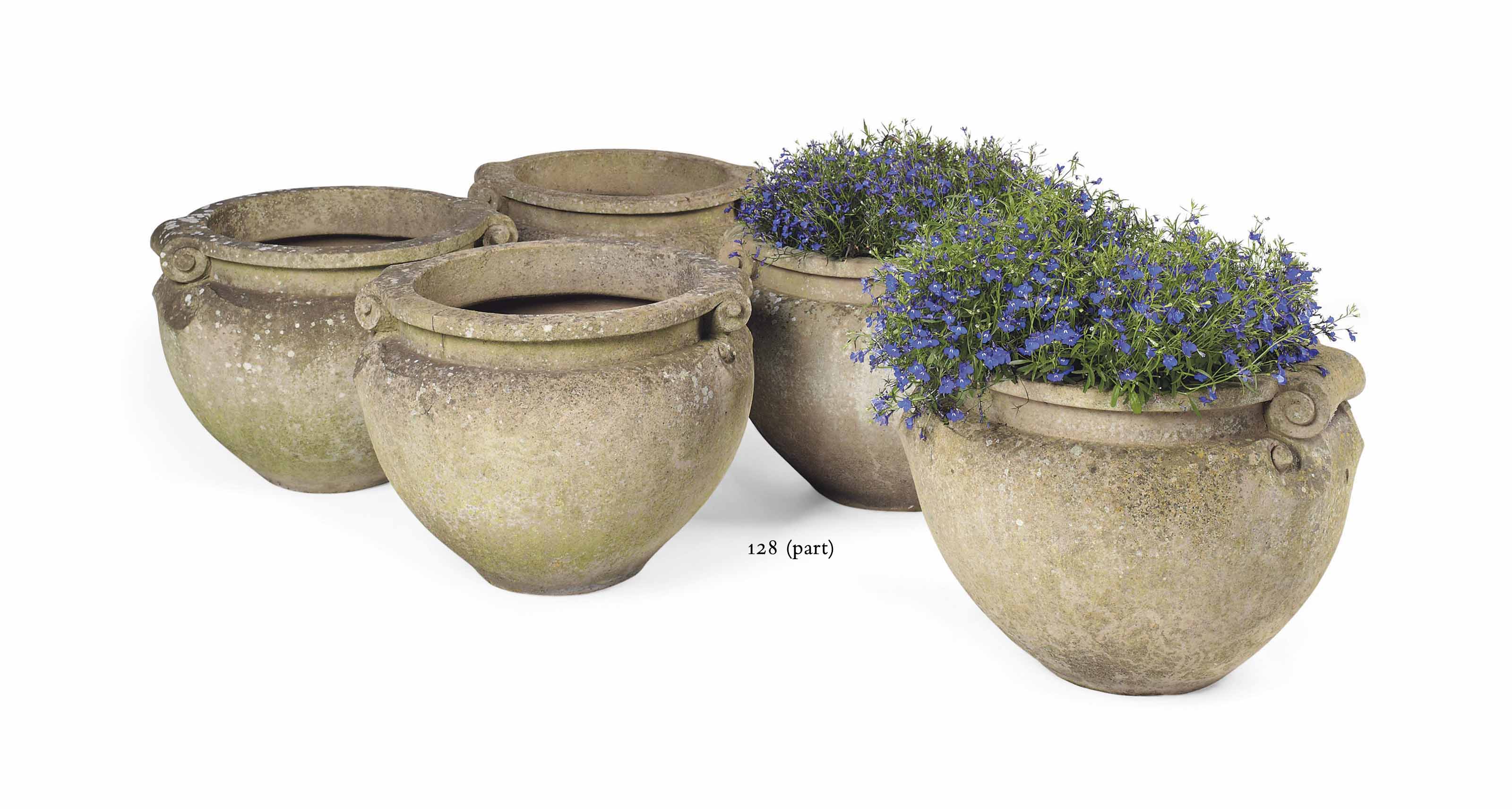 A GROUP OF SEVEN TERRACOTTA COMPTON 'SCROLL' POTS