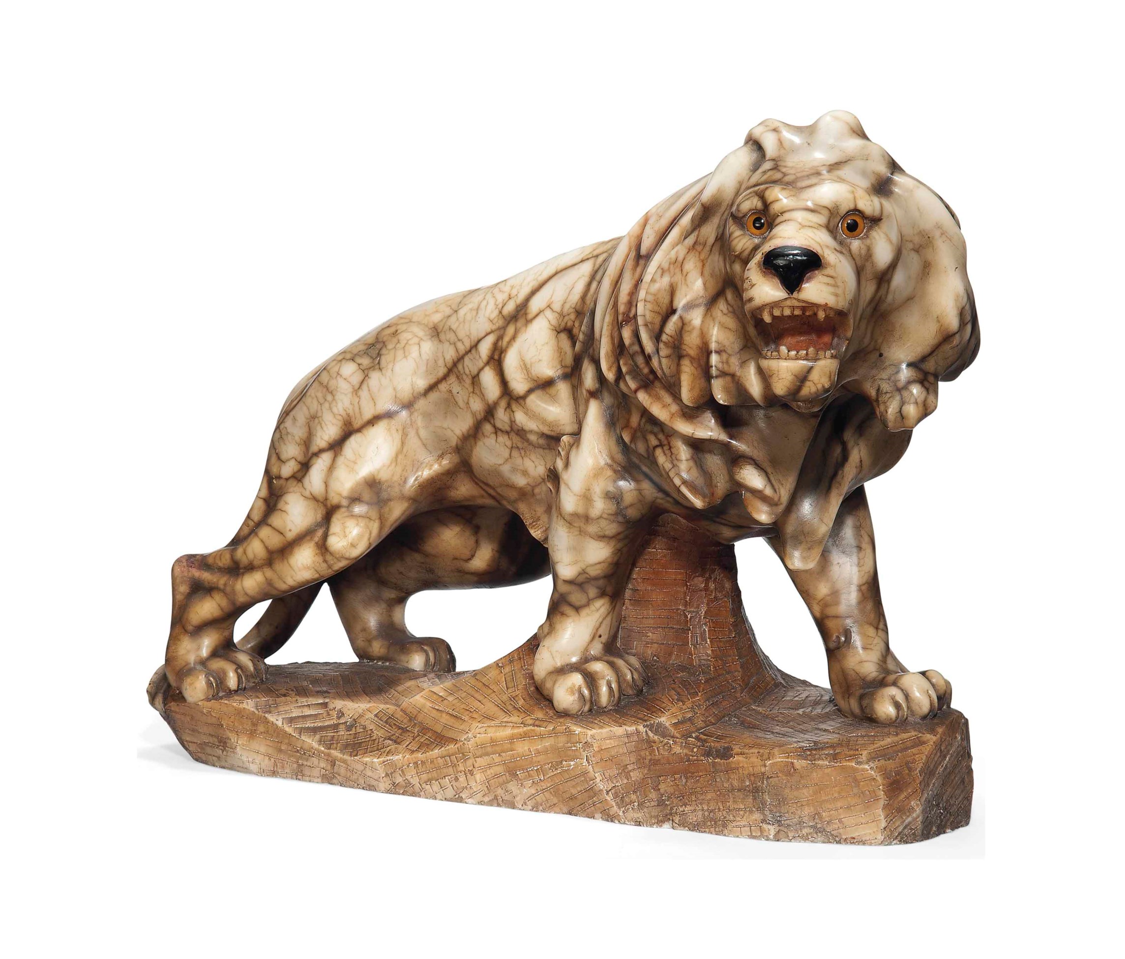 AN ITALIAN CARVED ALABASTER MODEL OF A PROWLING TIGER