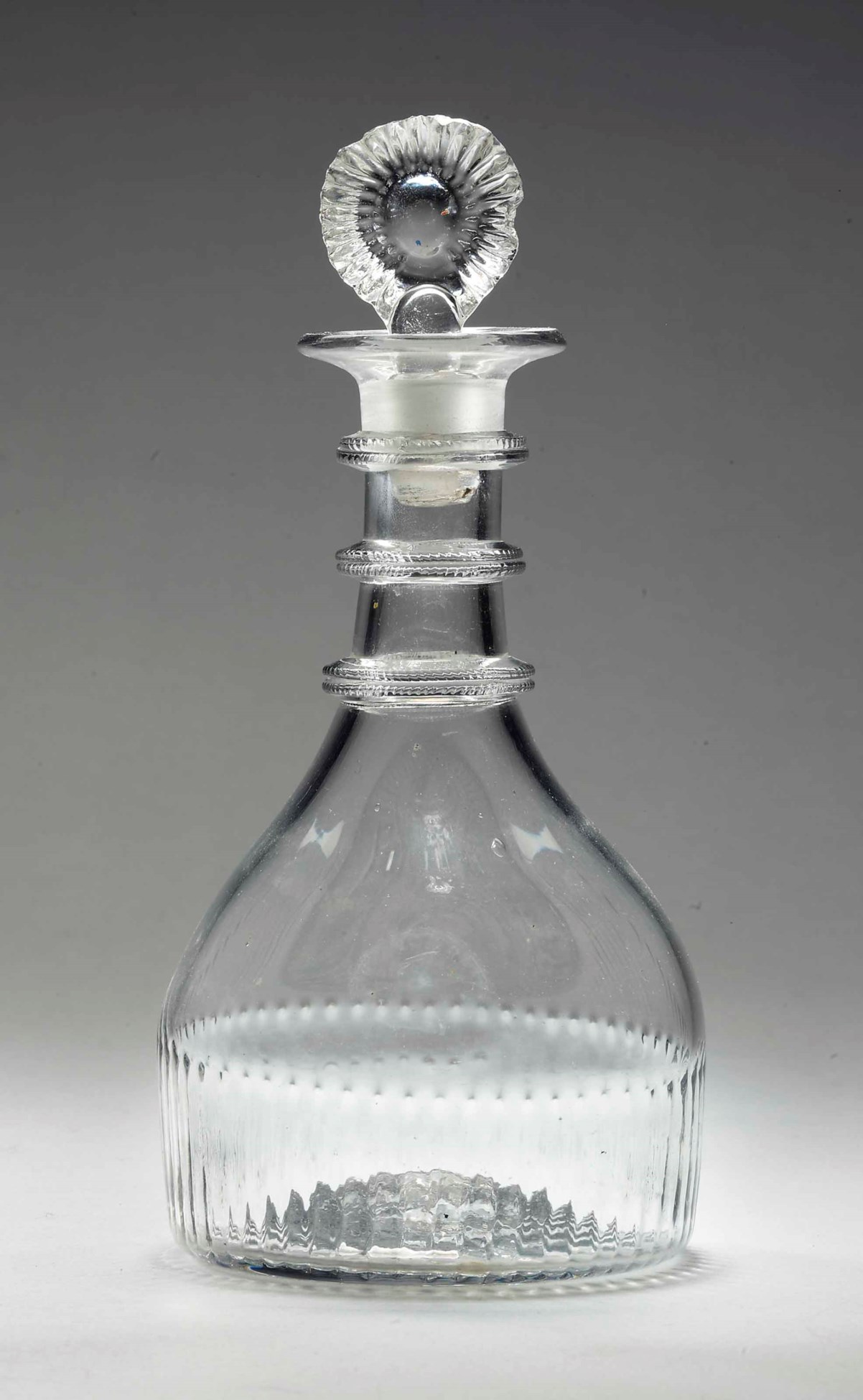 AN IRISH (CORK GLASS CO.) DECANTER AND STOPPER , CIRCA 1800, MOULDED ...