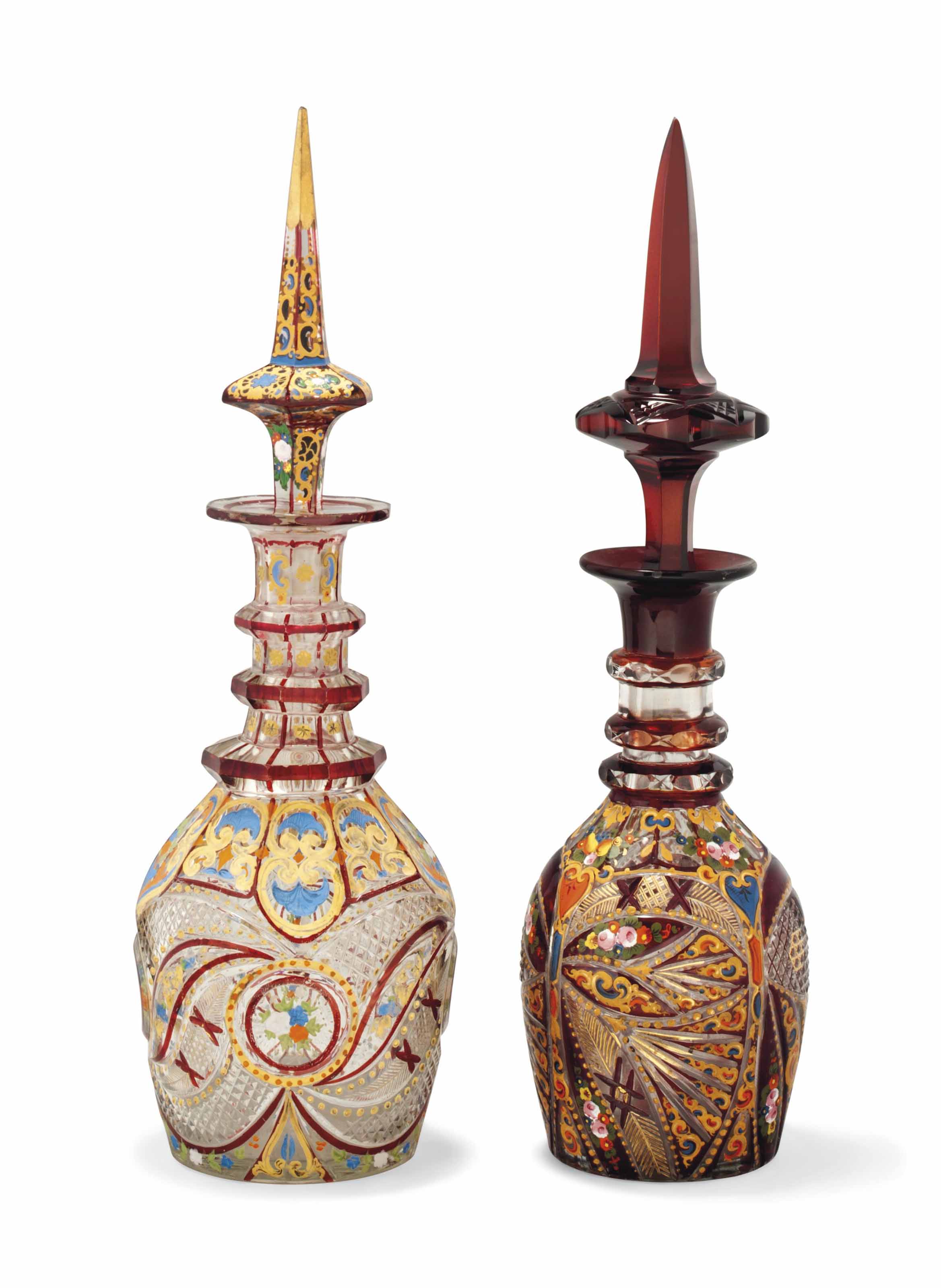 TWO BOHEMIAN CLEAR-FLASH RUBY-STAINED CUT-GLASS DECANTERS AND STOPPERS ...