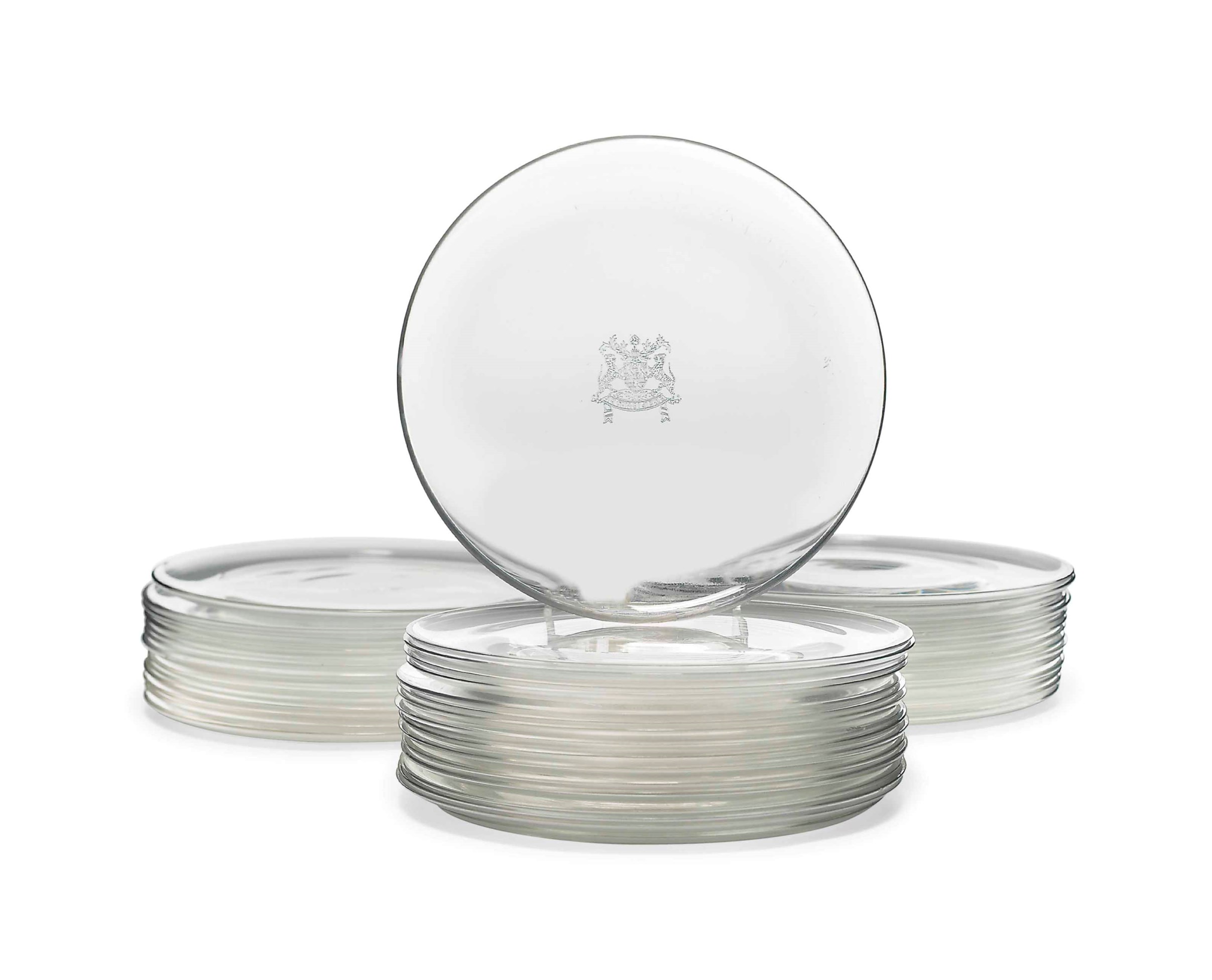 A SET OF FORTY-EIGHT ENGRAVED GLASS ICE PLATES