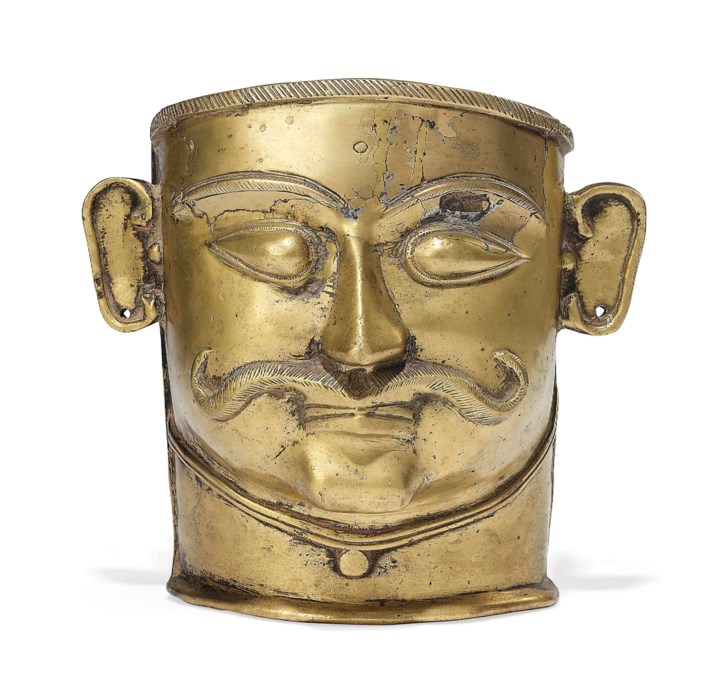 A LARGE PROCESSIONAL BRASS MASK , SOUTHERN INDIA, 19TH CENTURY | Christie's