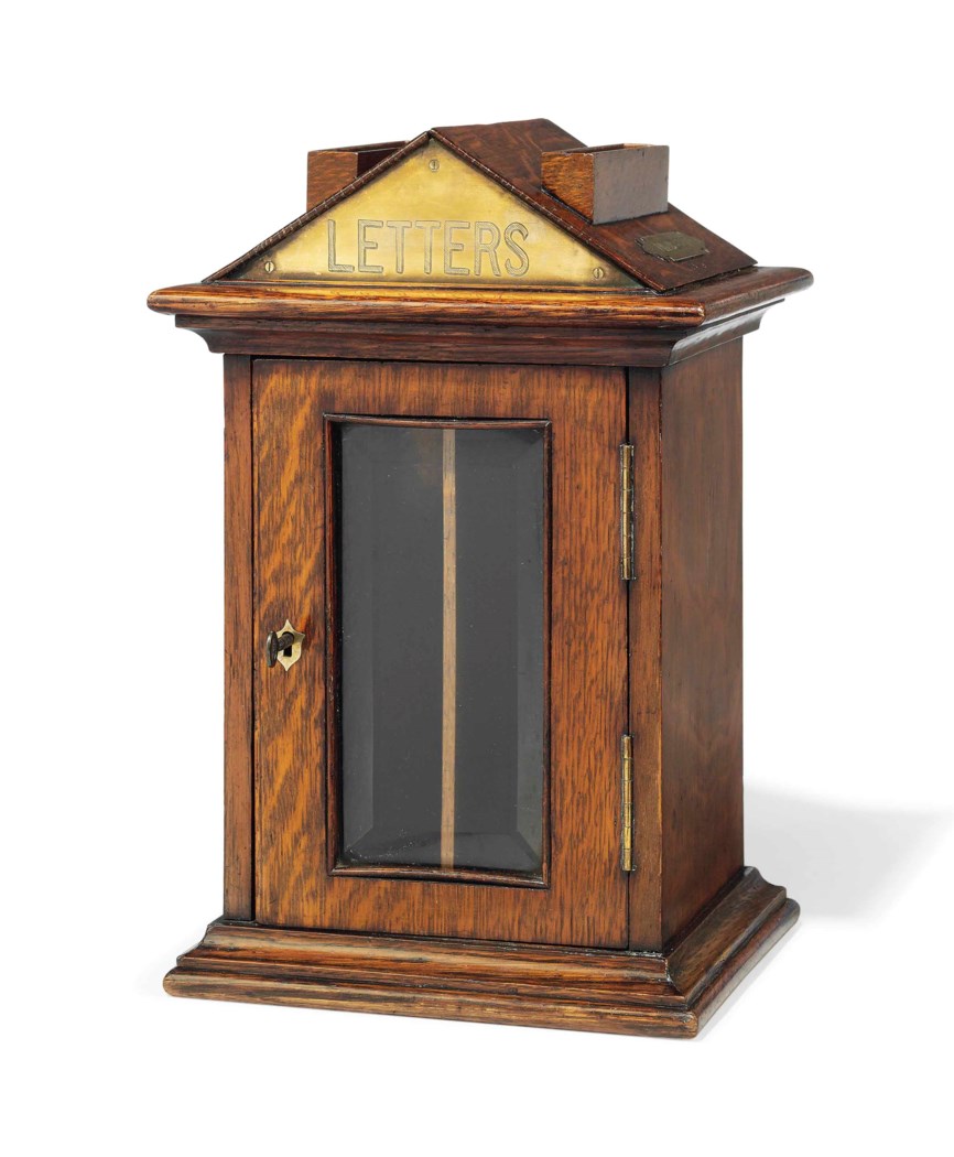 A VICTORIAN OAK AND BRASS-MOUNTED COUNTRY HOUSE LETTER-BOX , CIRCA 1870 ...