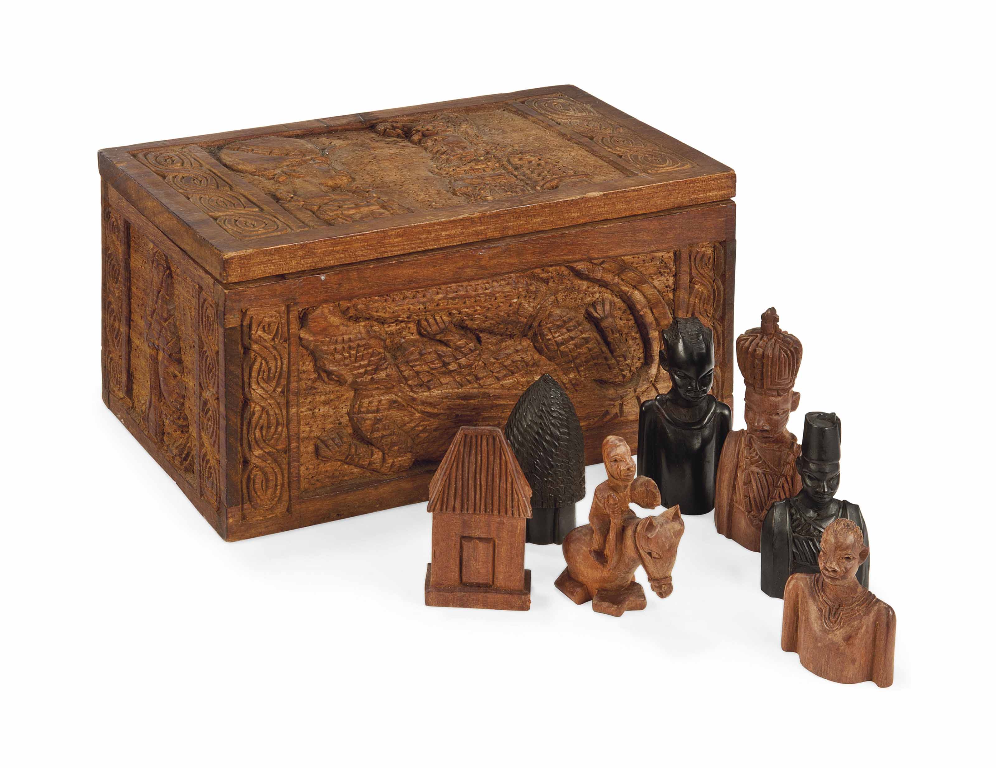 AN INDIAN GILT-HEIGHTENED POLYCHROME IVORY FIGURAL CHESS SET ...