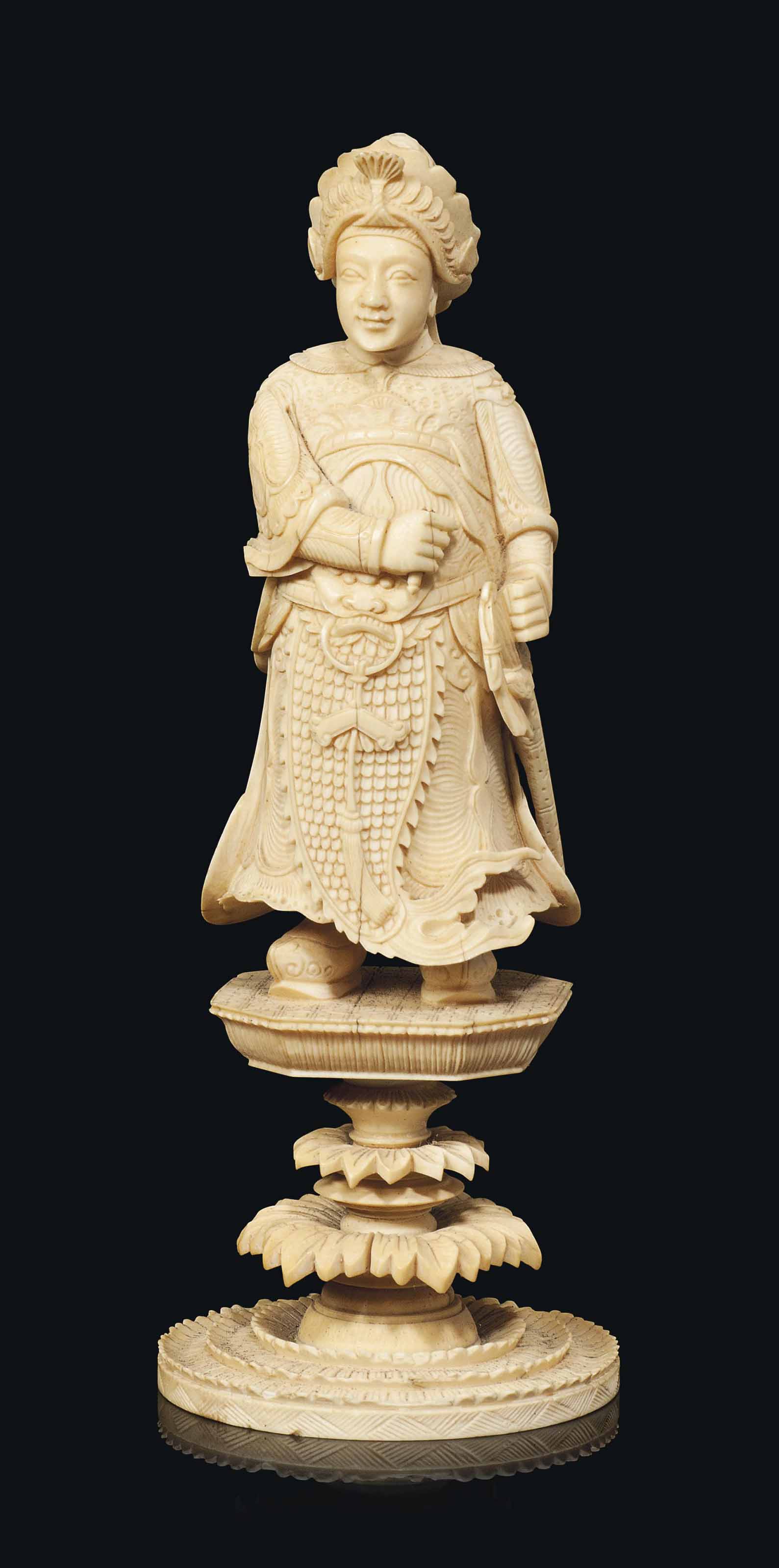 AN INDIAN GILT-HEIGHTENED POLYCHROME IVORY FIGURAL CHESS SET ...