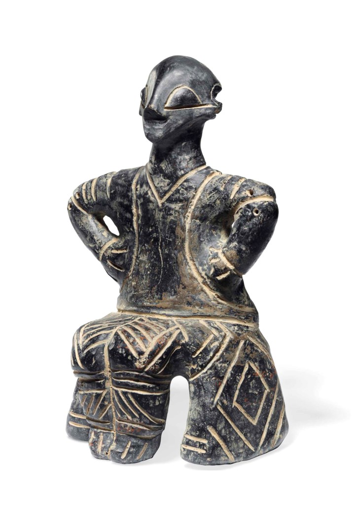 A VINCA TERRACOTTA SEATED MALE FIGURE , NEOLITHIC PERIOD, CIRCA 5TH ...