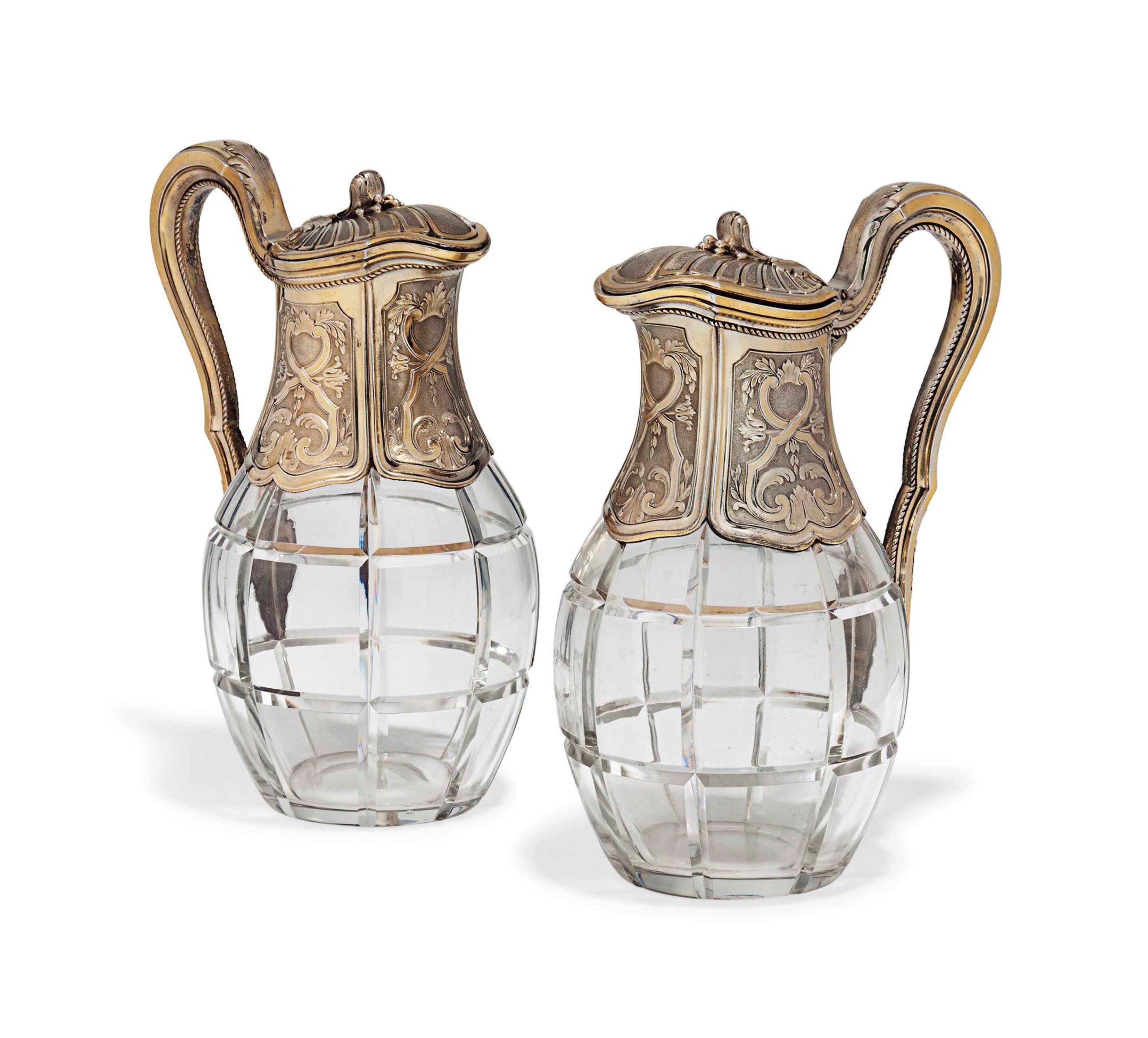 A PAIR OF FRENCH SILVER-GILT MOUNTED GLASS CLARET JUGS , MARK OF VEUVE ...