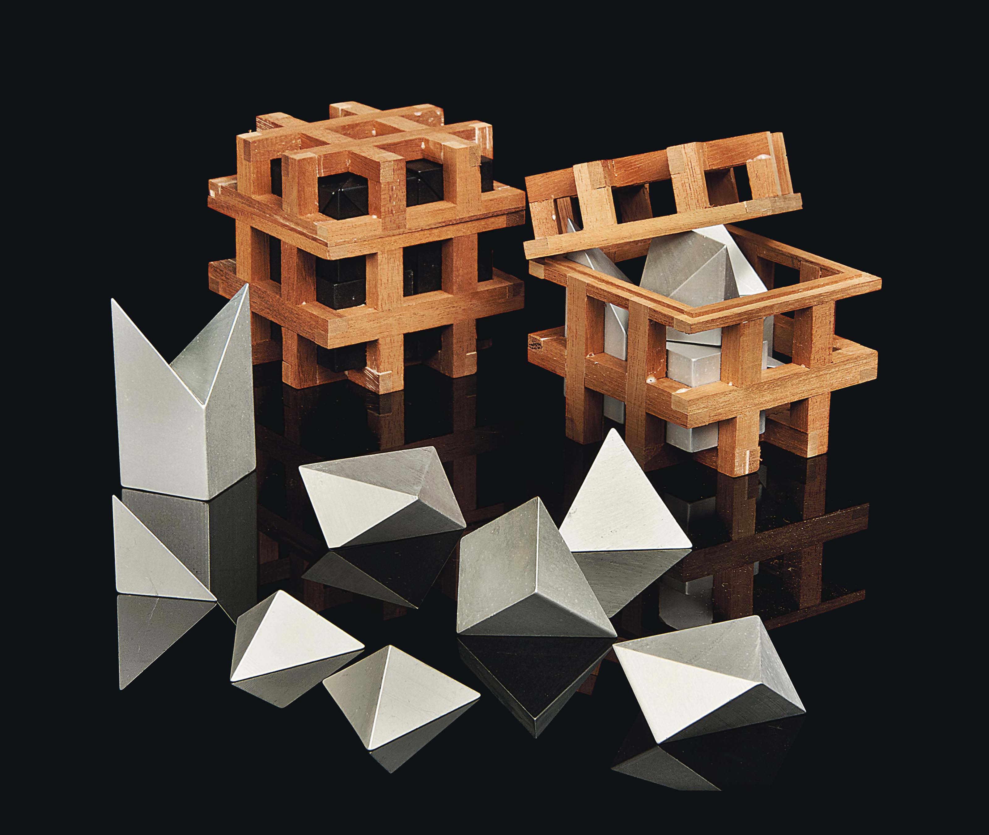 A WALNUT AND BEECH CHESS SET, BY MAN RAY (1890-1946), 1947 | Christie's