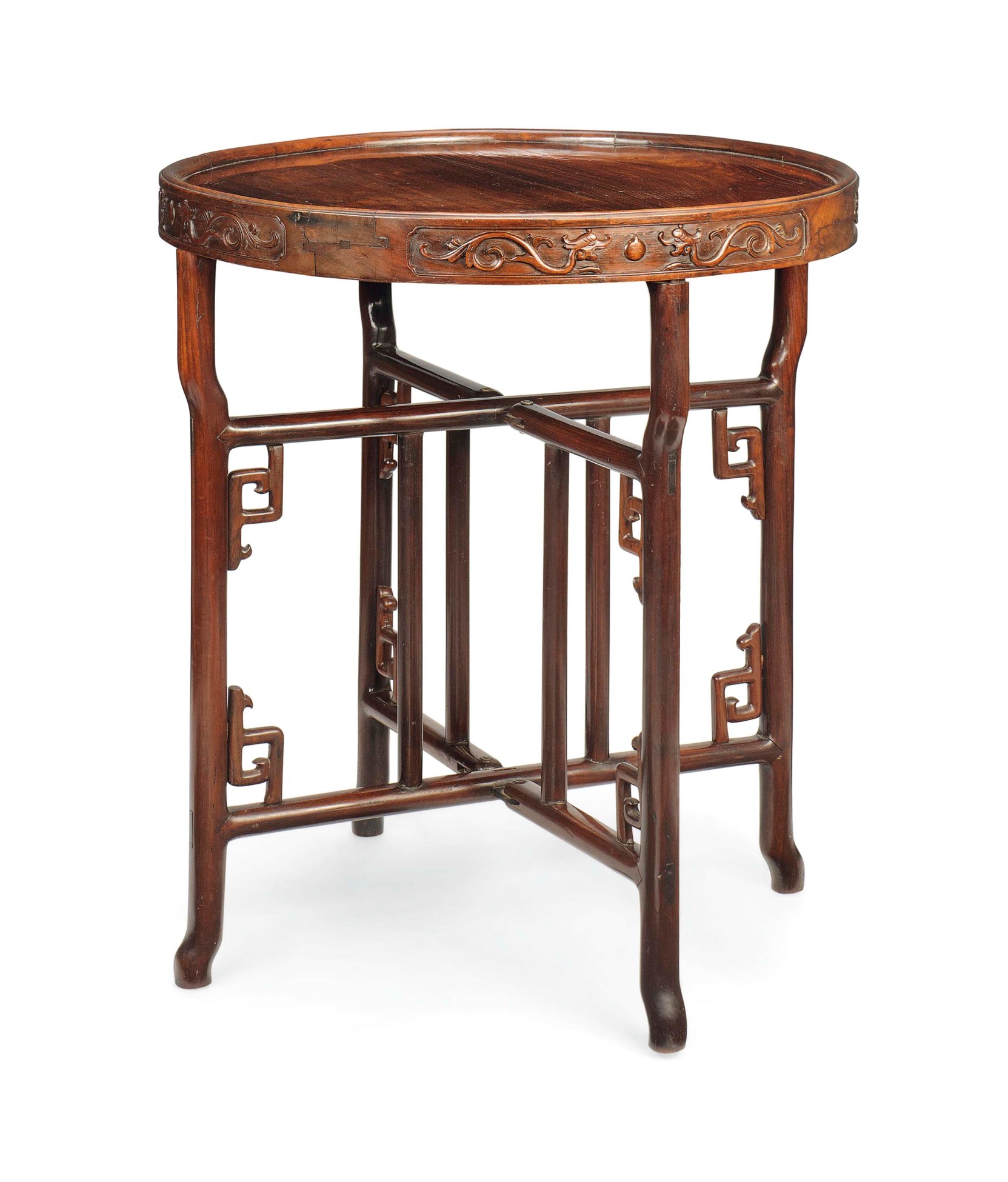 A CHINESE HARDWOOD CIRCULAR TABLE , 20TH CENTURY | Christie's