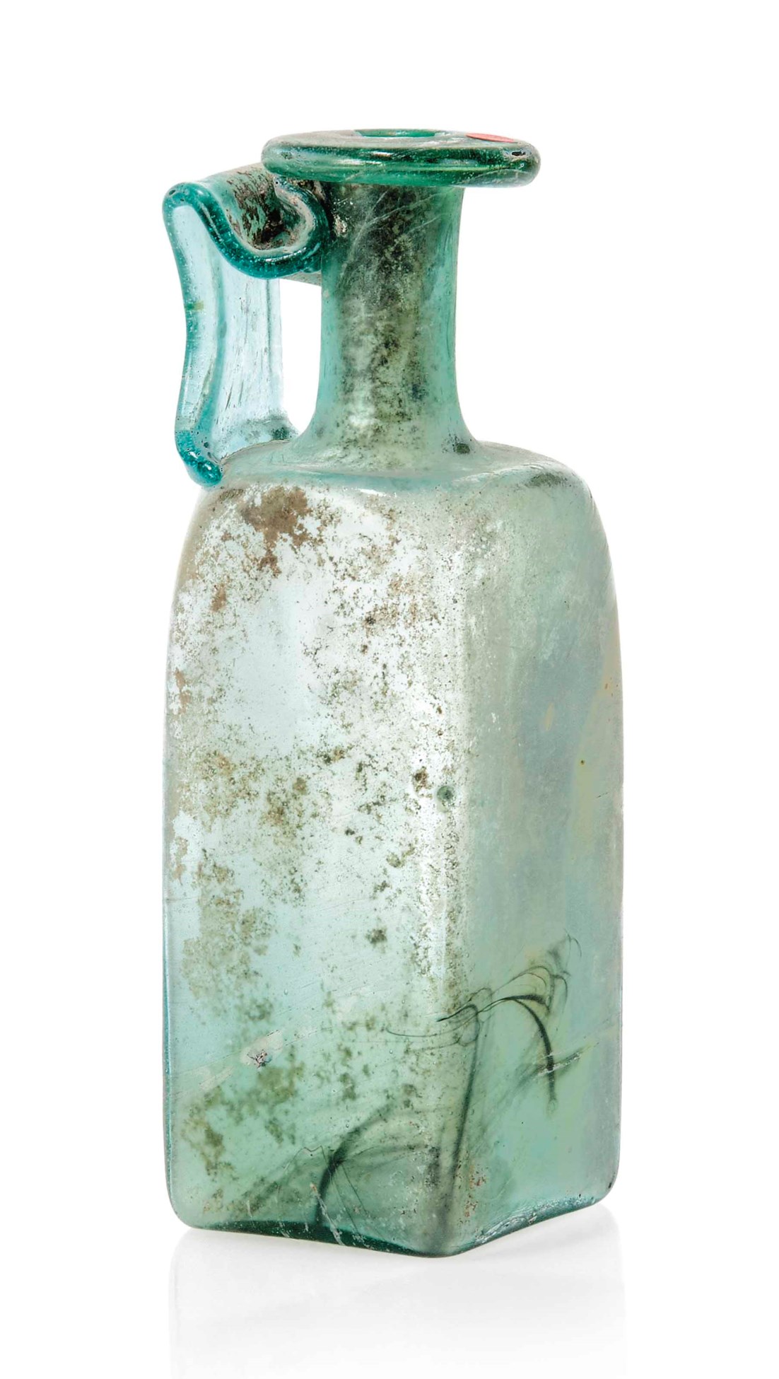 A ROMAN BLUE GLASS SQUARE-SIDED JUG , CIRCA 1ST-2ND CENTURY A.D ...