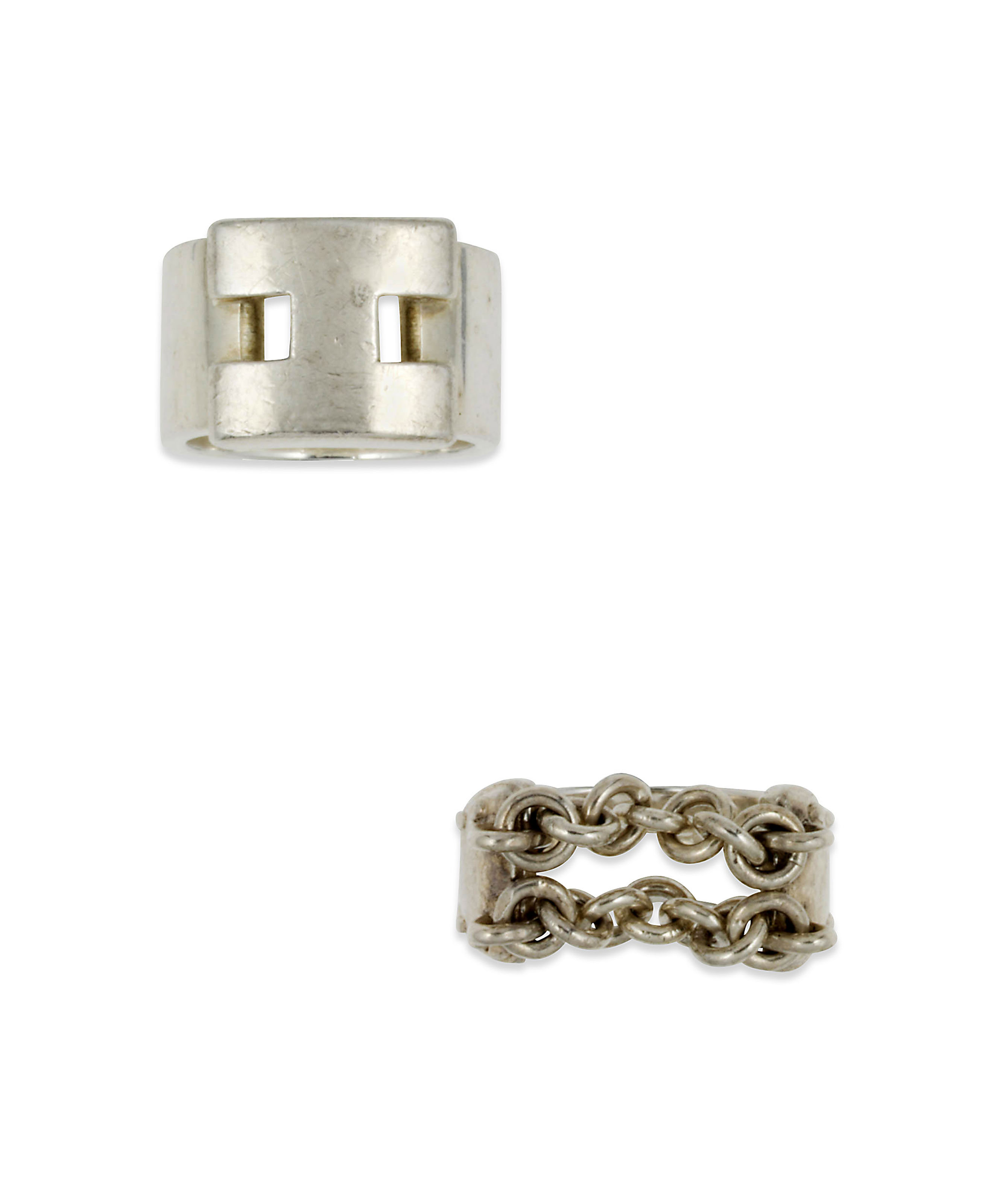 TWO SILVERTONE METAL RINGS, HERMÈS | Christie’s