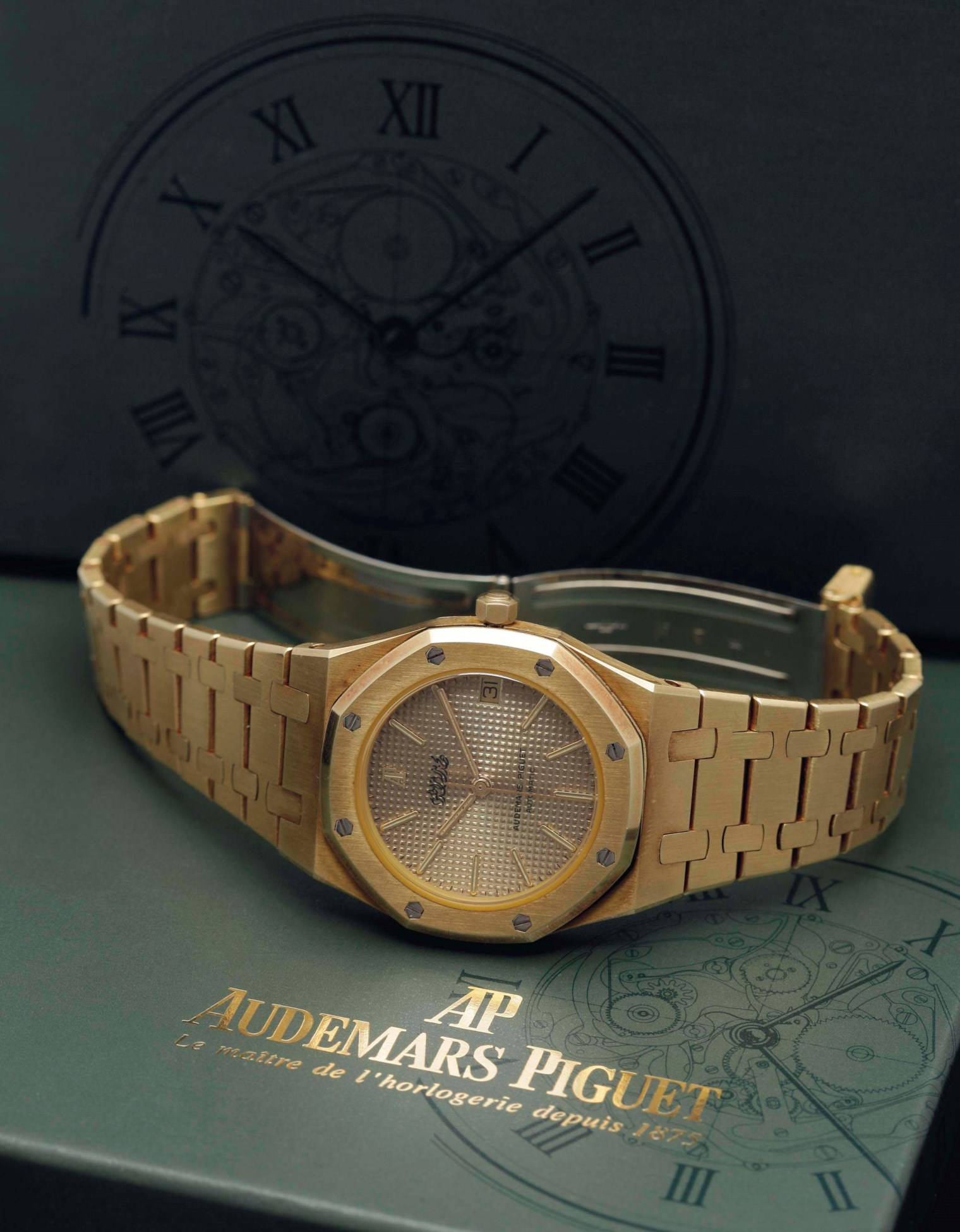AUDEMARS PIGUET. A RARE 18K GOLD AUTOMATIC BRACELET WATCH WITH SWEEP ...