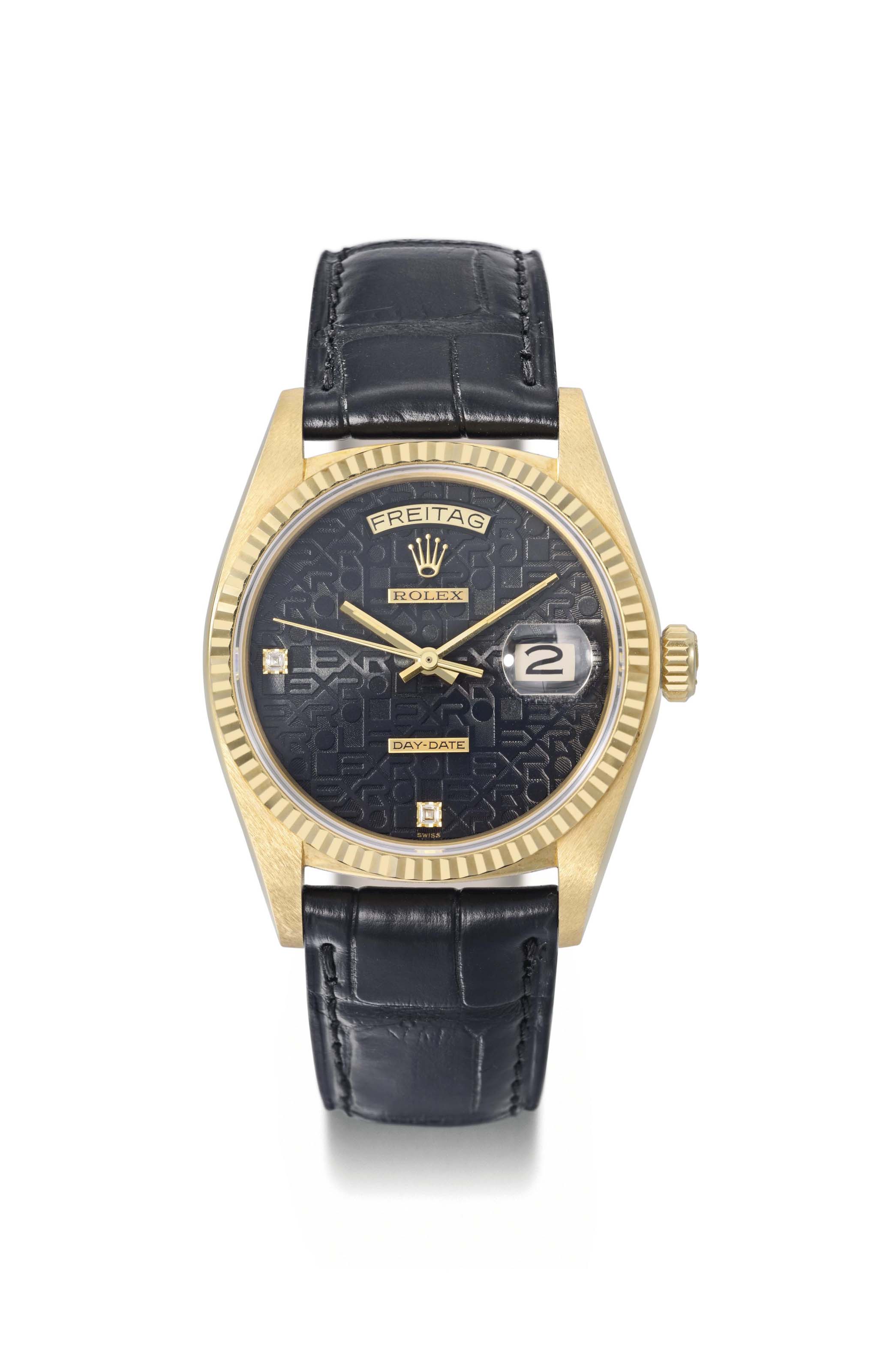 Rolex. An attractive and unusual 18K gold automatic calendar wristwatch ...
