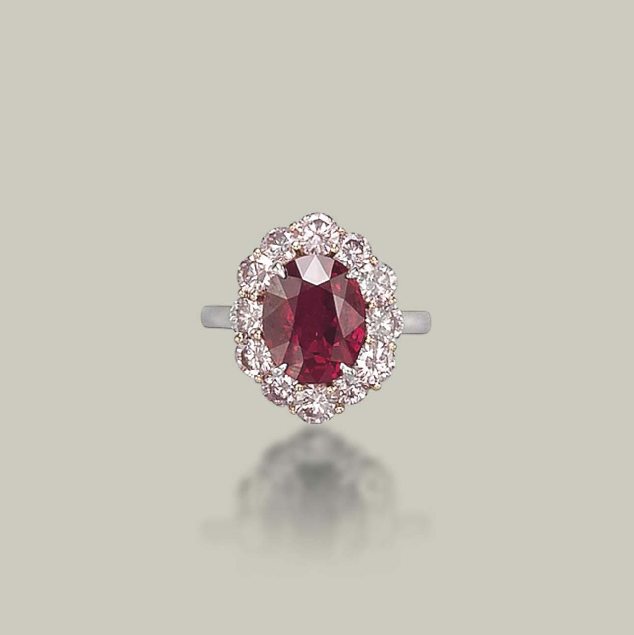 A PAIR OF RUBY AND DIAMOND EAR CLIPS, BY HARRY WINSTON | Christie's