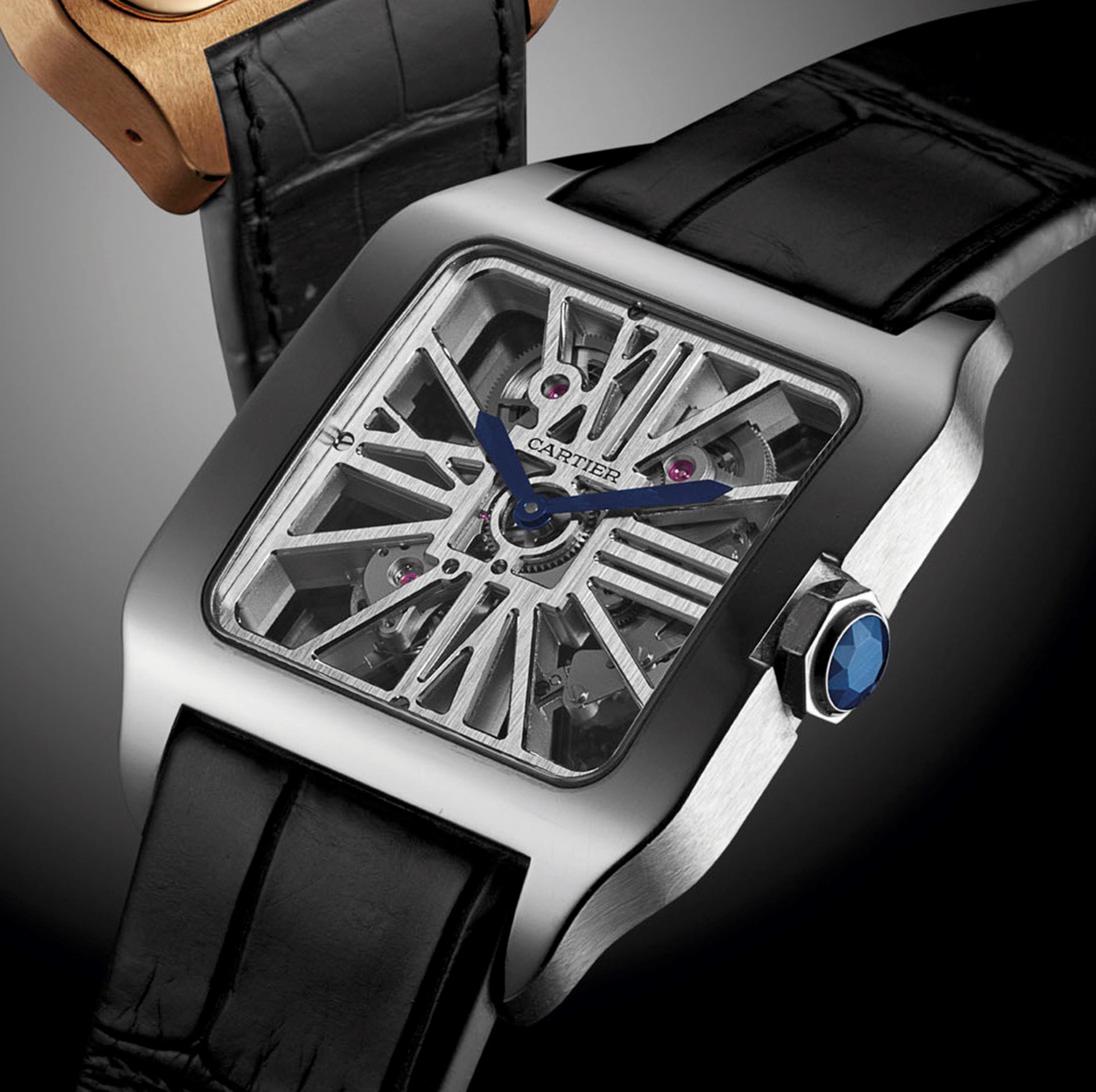 CARTIER. A RARE AND LARGE 18K WHITE GOLD SQUARE SKELETONISED WRISTWATCH