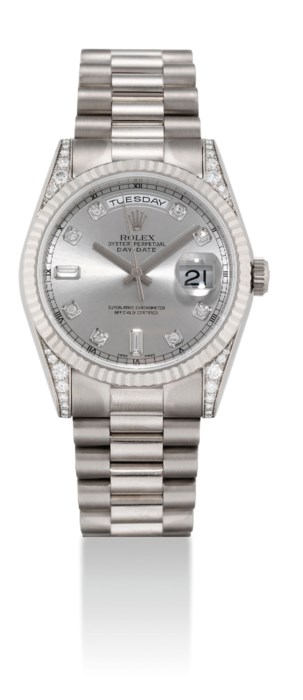 ROLEX. A FINE AND RARE 18K WHITE GOLD AND DIAMOND-SET AUTOMATIC ...