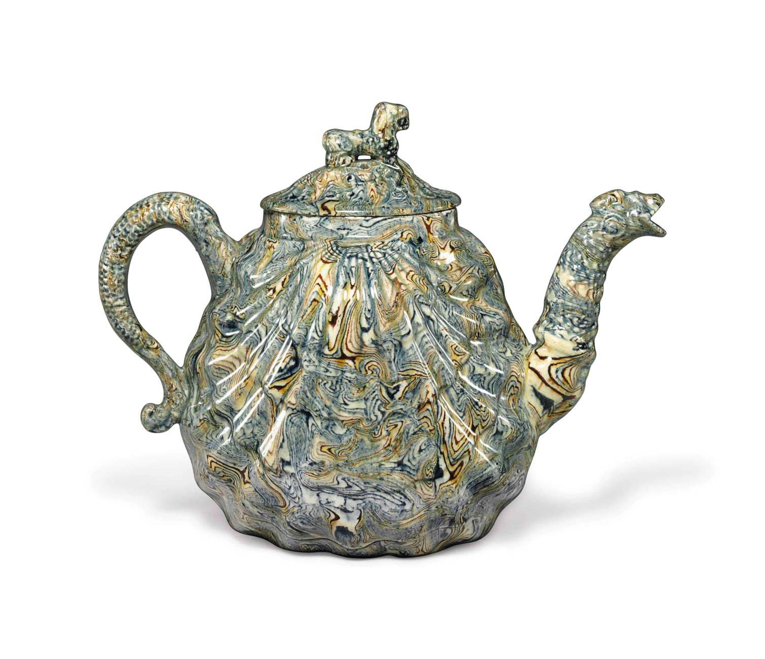 A STAFFORDSHIRE GLAZED SOLID-AGATE PECTEN-SHELL TEAPOT AND COVER ...