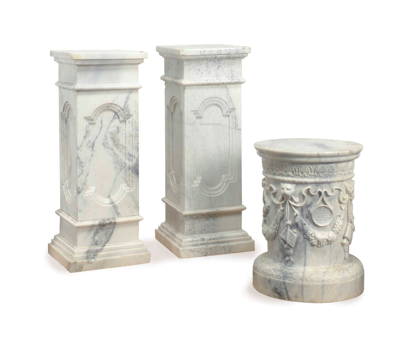 A PAIR OF CARVED WHITE MARBLE SQUARE PEDESTALS, AND A SMALLER CARVED ...