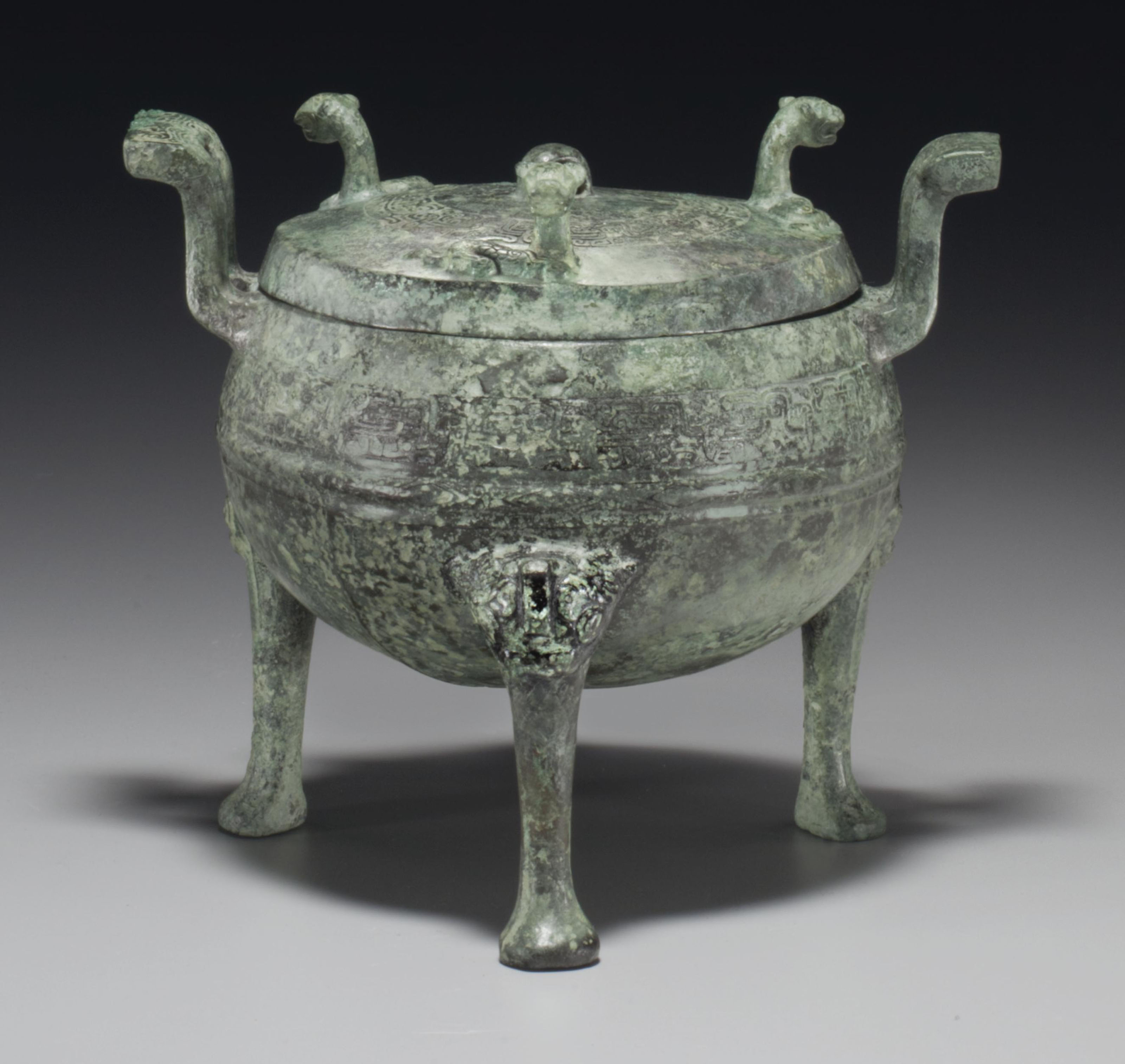 A MASSIVE RITUAL BRONZE TRIPOD FOOD VESSEL, DING , SPRING AND AUTUMN ...