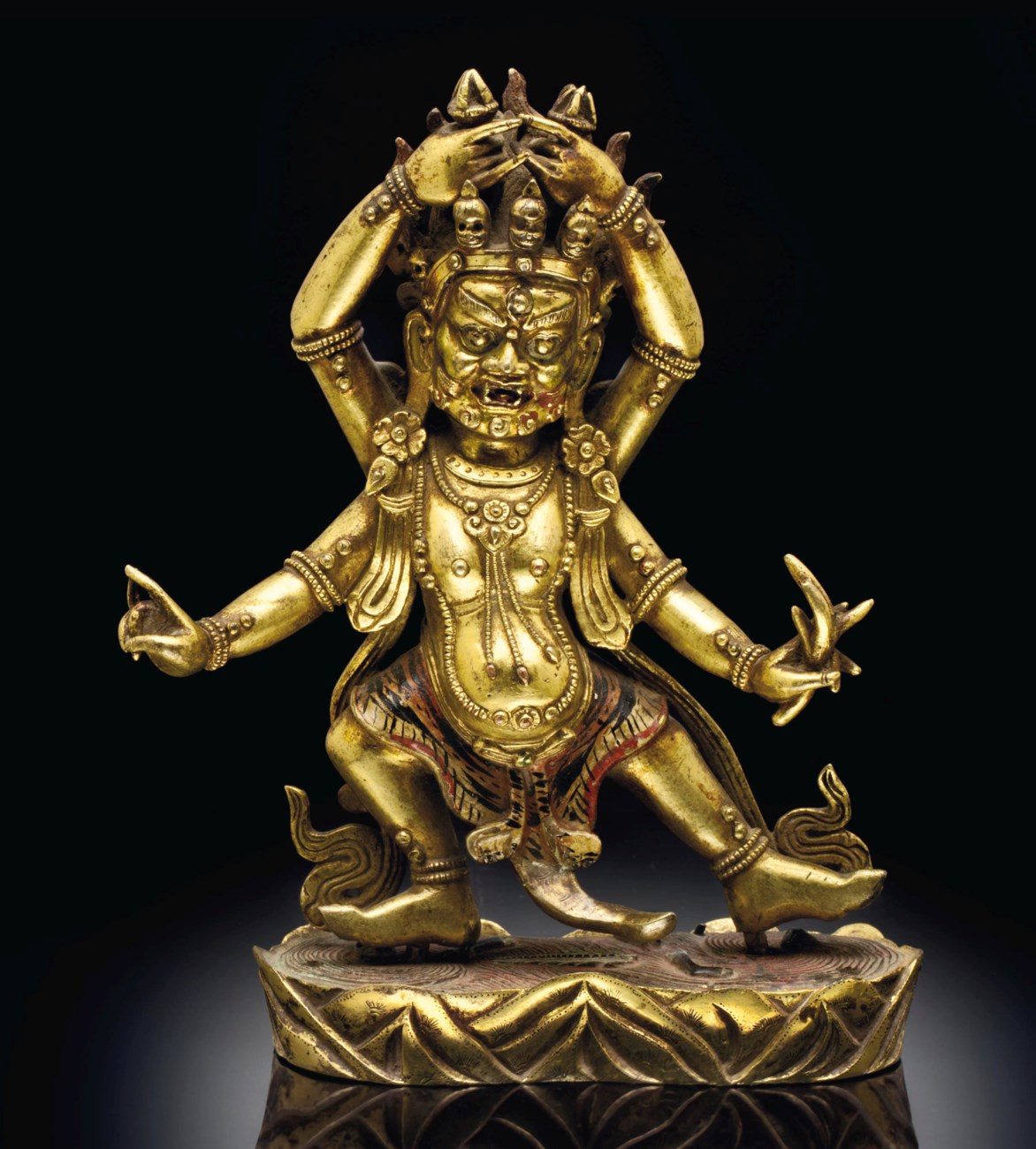 A RARE GILT-BRONZE FIGURE OF A WRATHFUL DEITY , 18TH CENTURY | Christie's