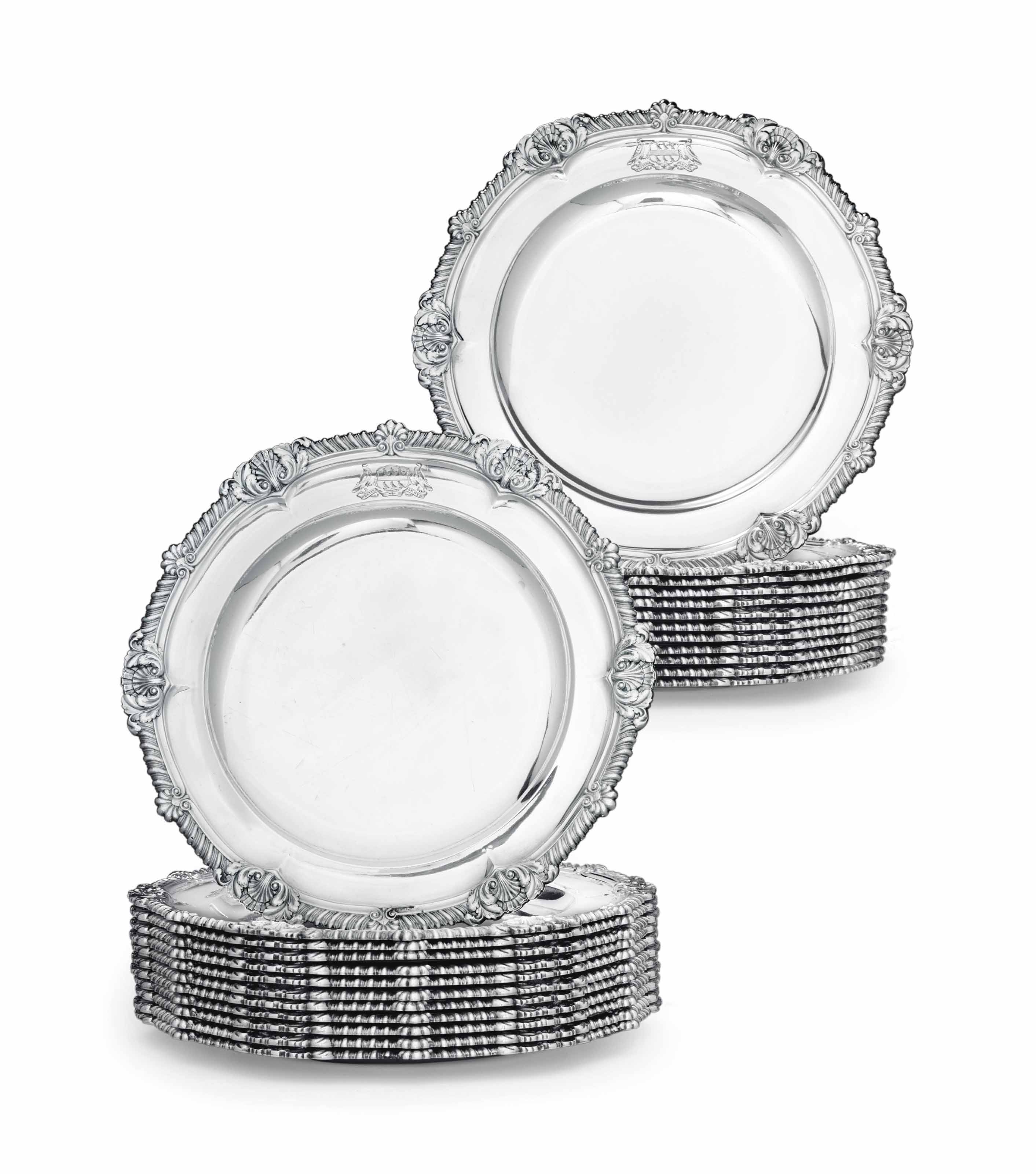 A SET OF TWENTY-FOUR REGENCY SILVER DINNER PLATES FROM THE ONSLOW SERVICE