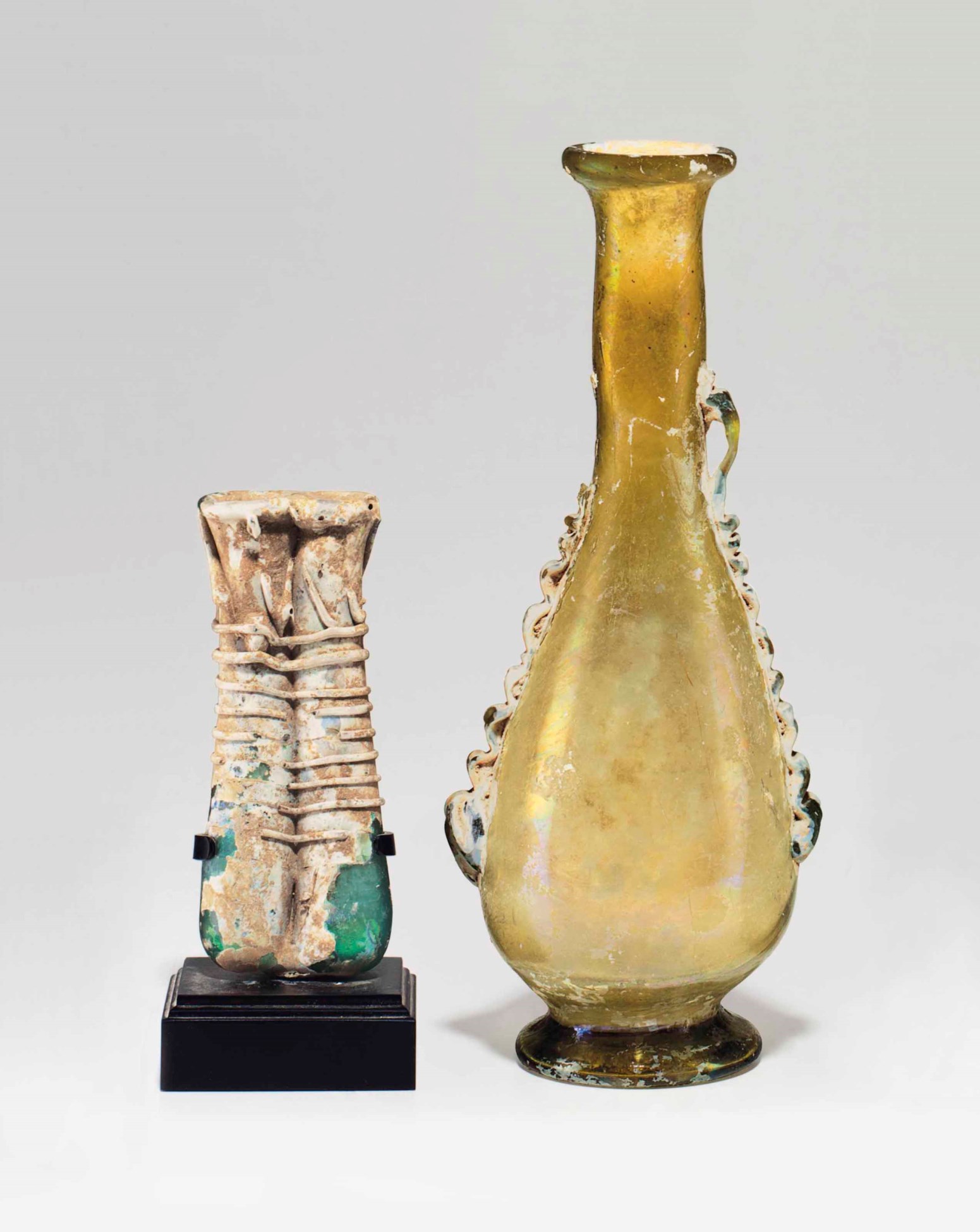 TWO ANCIENT GLASS VESSELS , CIRCA 3RD-4TH CENTURY A.D. | Christie's