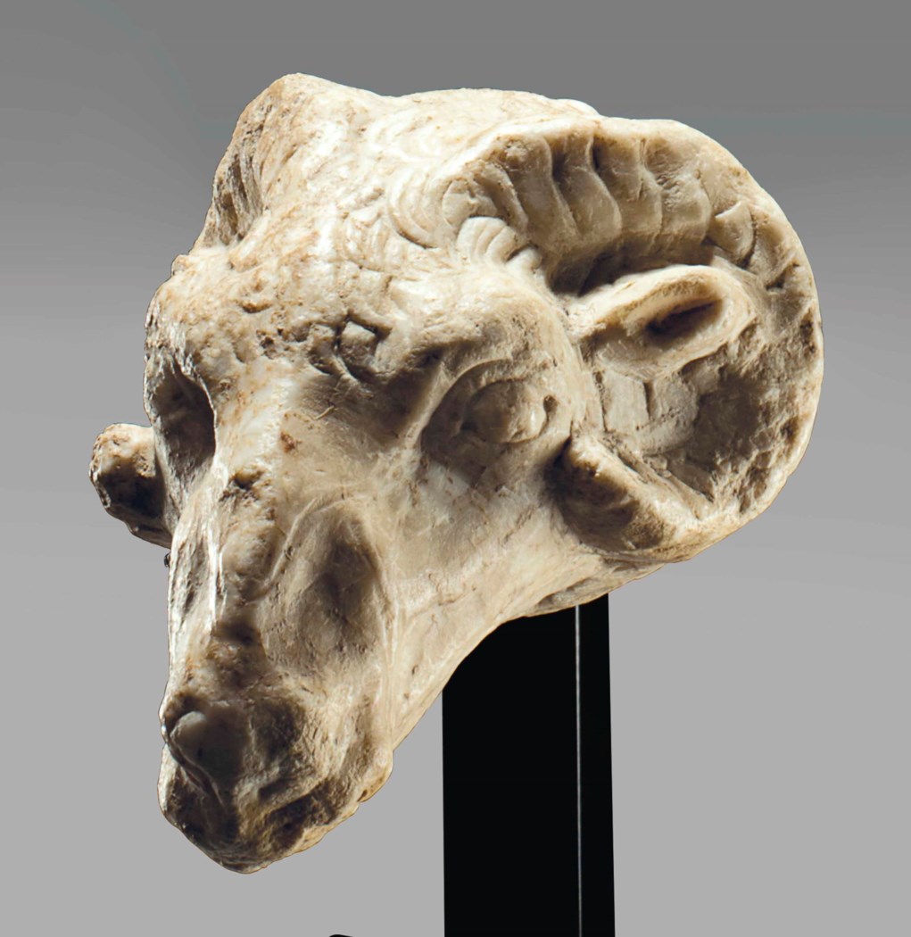 A GREEK MARBLE RAM HEAD , ARCHAIC PERIOD, CIRCA EARLY 5TH CENTURY B.C ...