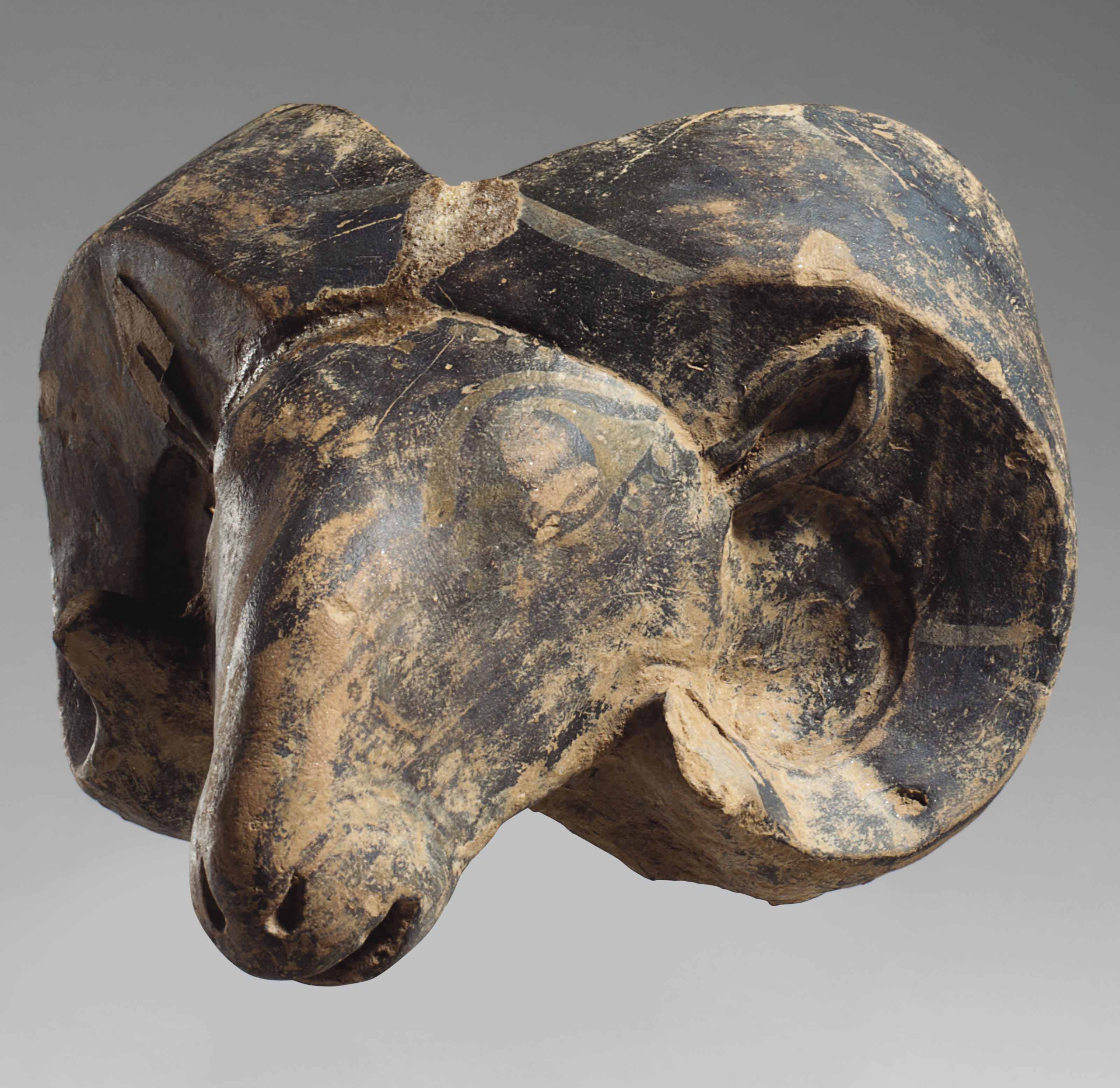 A GREEK MARBLE RAM HEAD , ARCHAIC PERIOD, CIRCA EARLY 5TH CENTURY B.C ...