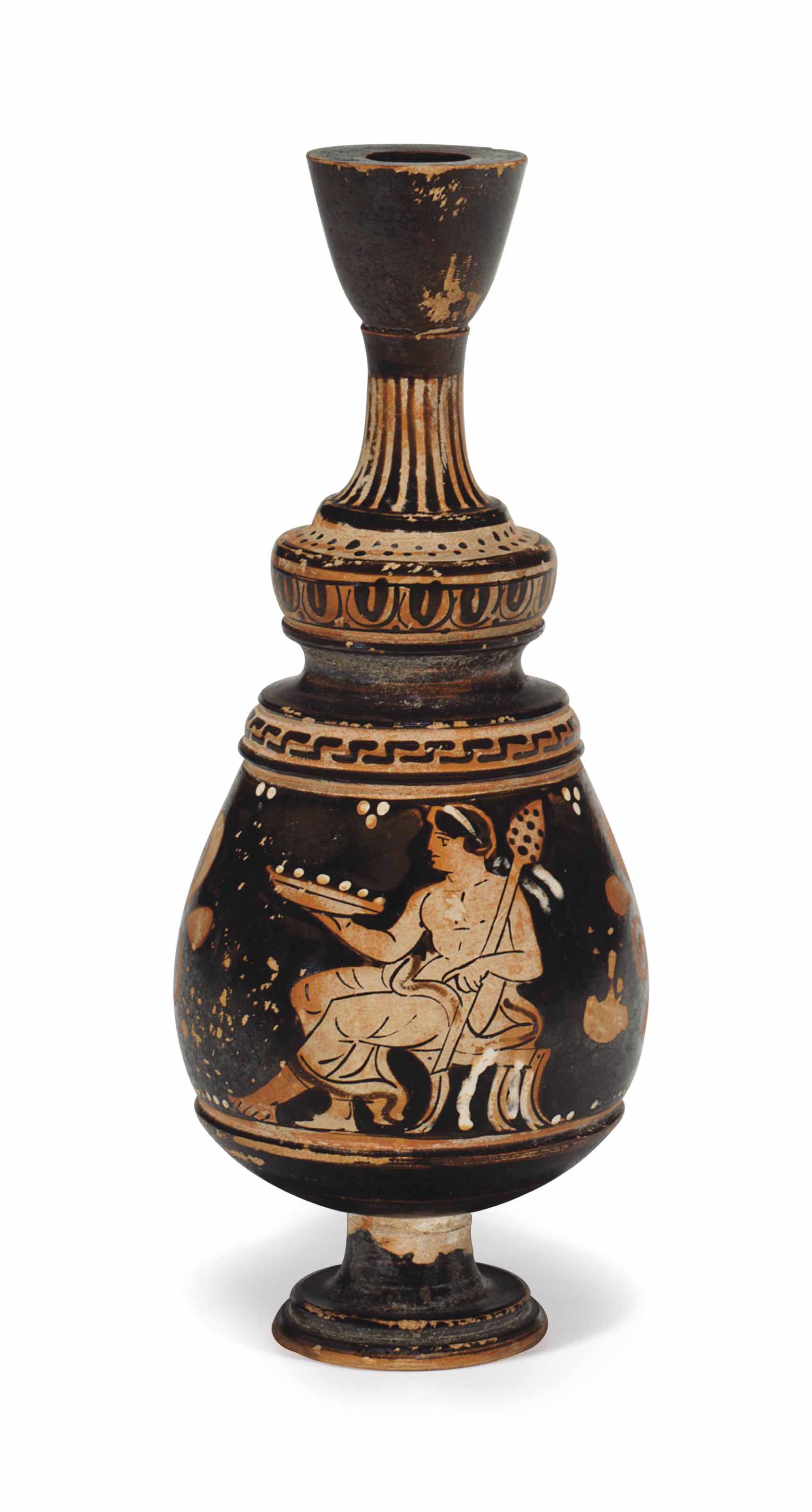 A GREEK GILT TERRACOTTA APPLIQUÉ , TARANTINE, CIRCA 350-325 B.C ...