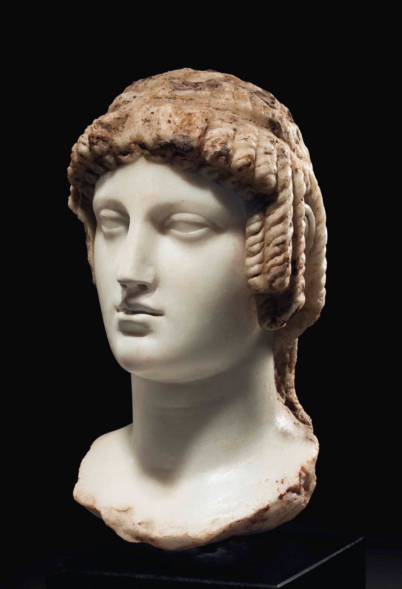 A GREEK MARBLE BUST OF ISIS , PTOLEMAIC PERIOD, CIRCA 2ND-1ST CENTURY B ...