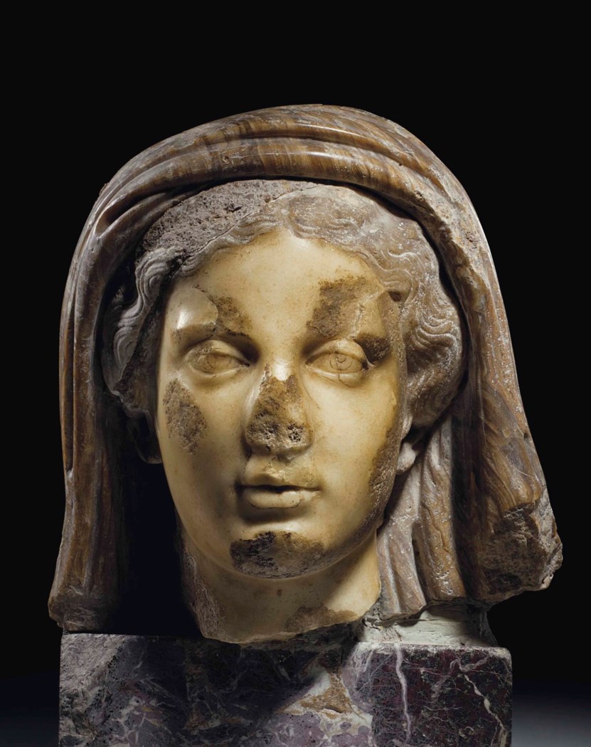 A ROMAN MARBLE PORTRAIT HEAD OF THE EMPRESS FAUSTINA MINOR