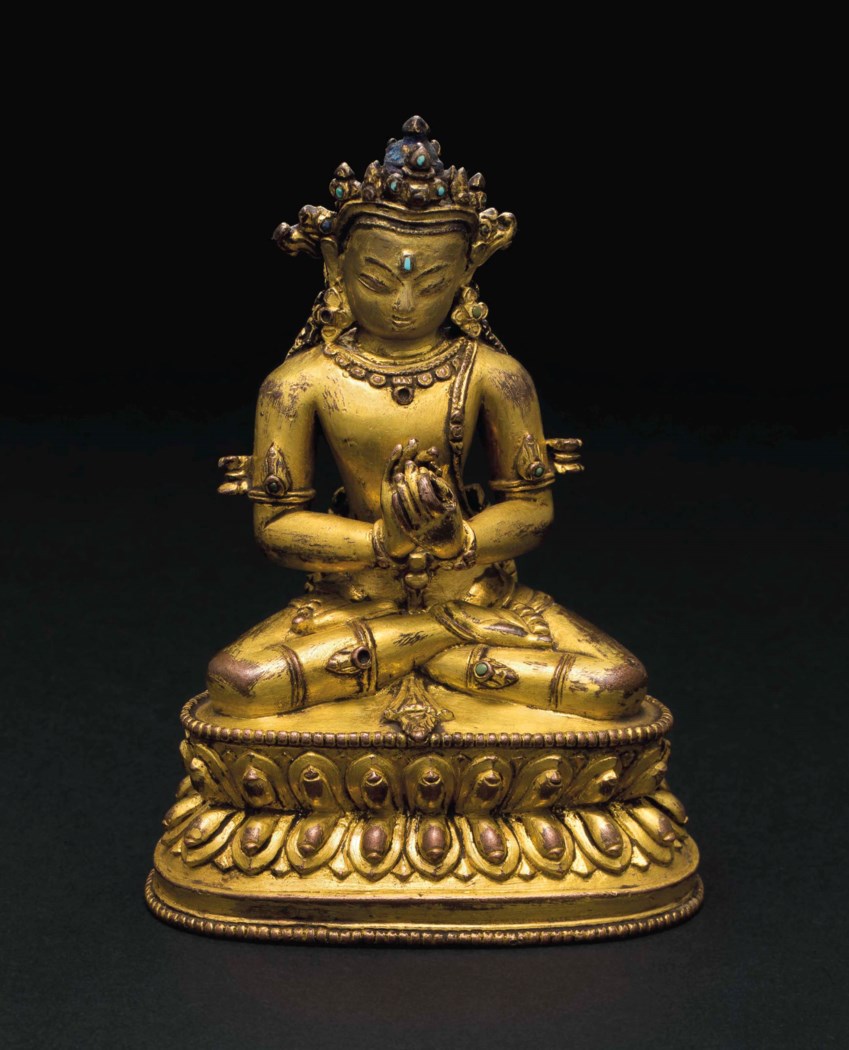 A gilt bronze figure of Vairochana , NEPAL, 14TH/15TH CENTURY | Christie's