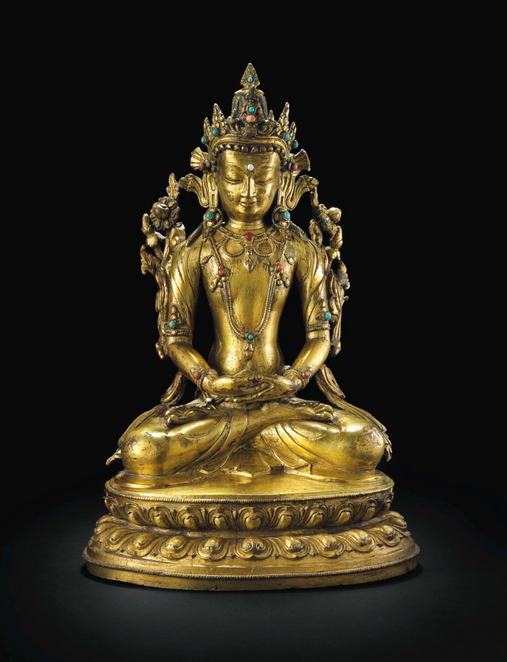 A gilt bronze figure of Amitayus , TIBET, 16TH CENTURY | Christie's