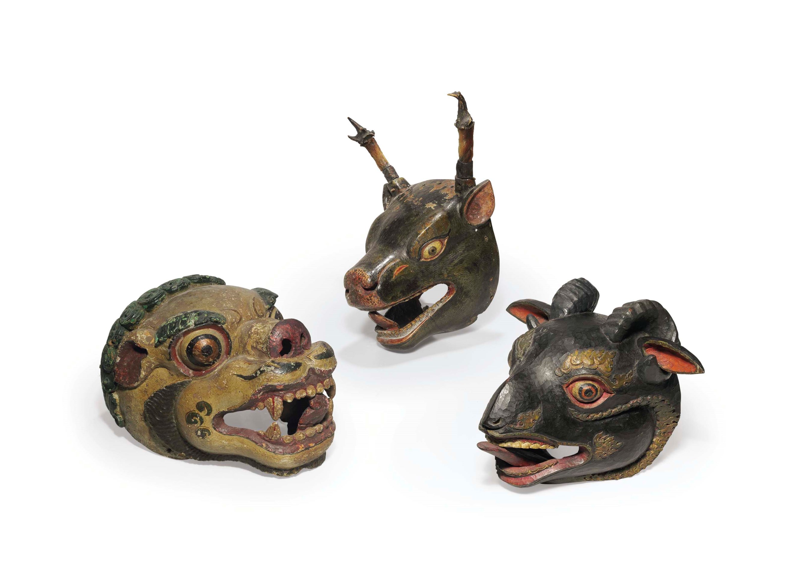 A group of three polychromed wood animal masks , TIBET, 18TH/19TH ...