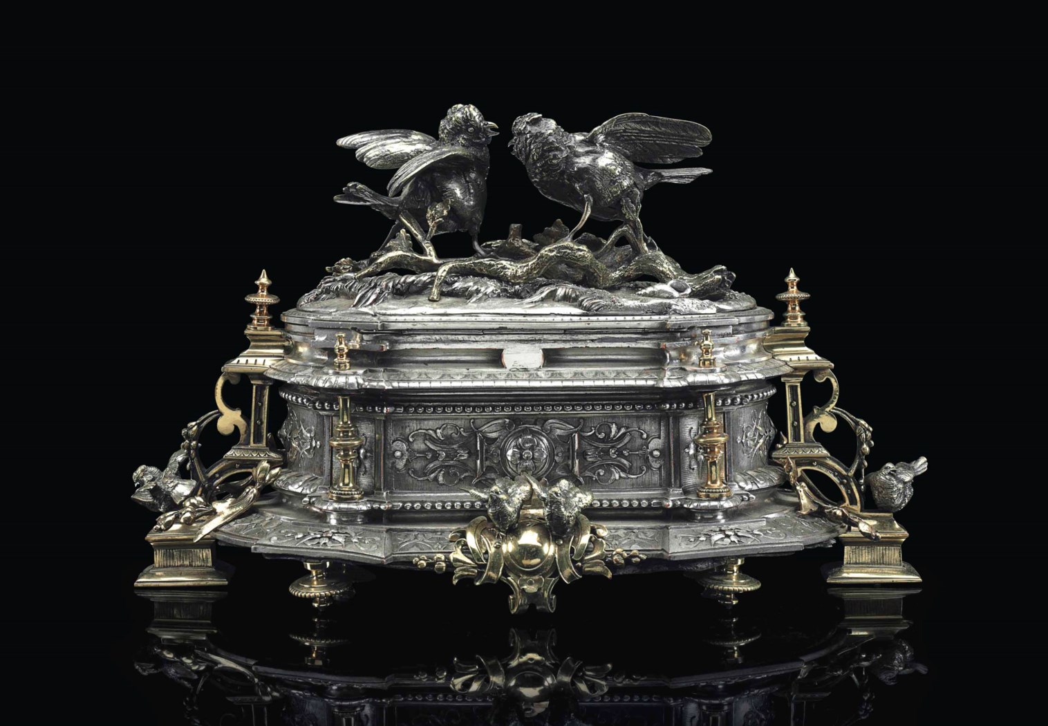 A NAPOLEON III PARCEL-GILT AND SILVERED-METAL TABLE CASKET