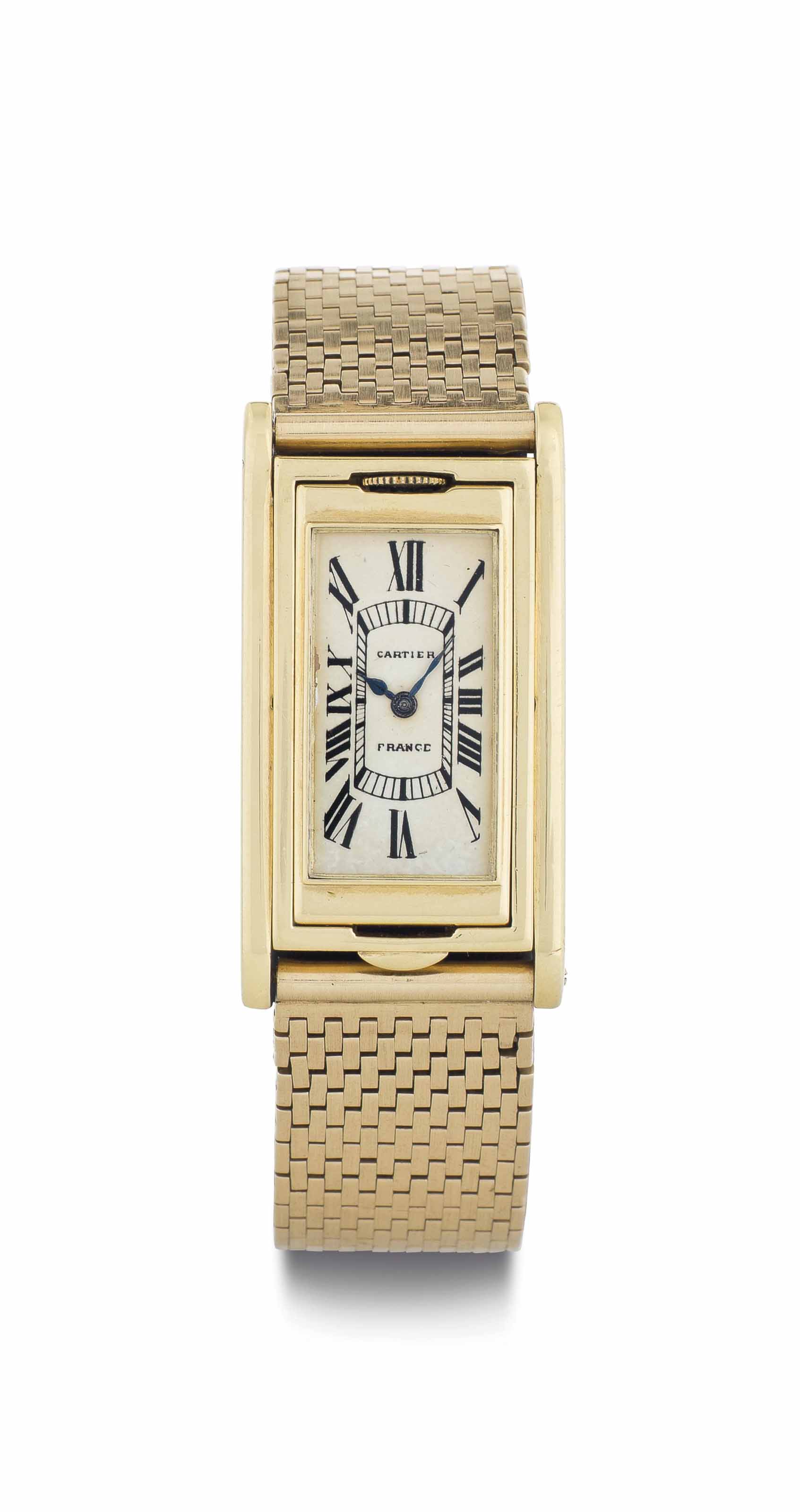 Cartier. An 18k Gold Rectangular Reversible Wristwatch