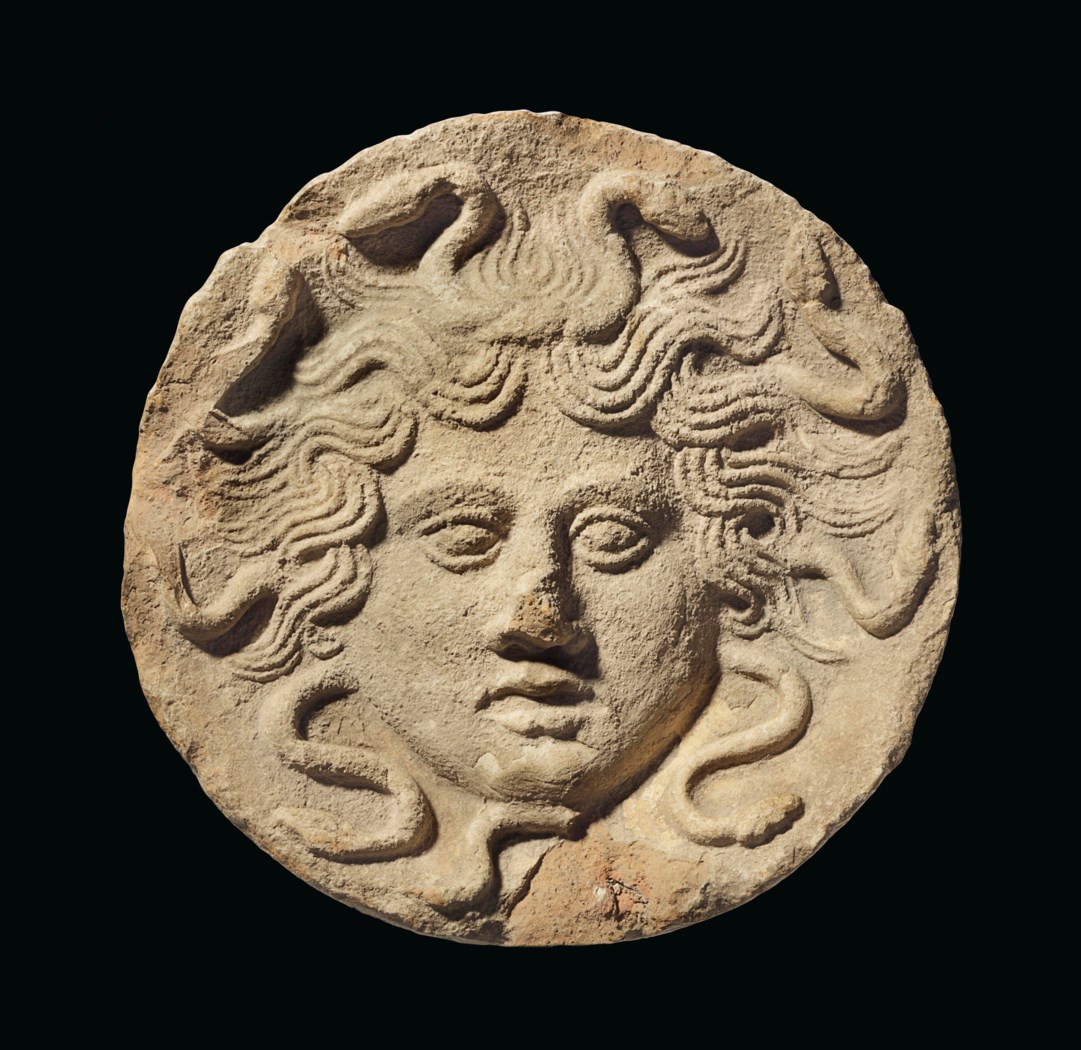 A GREEK TERRACOTTA ANTEFIX , CLASSICAL PERIOD, CIRCA MID 5TH-MID 4TH ...