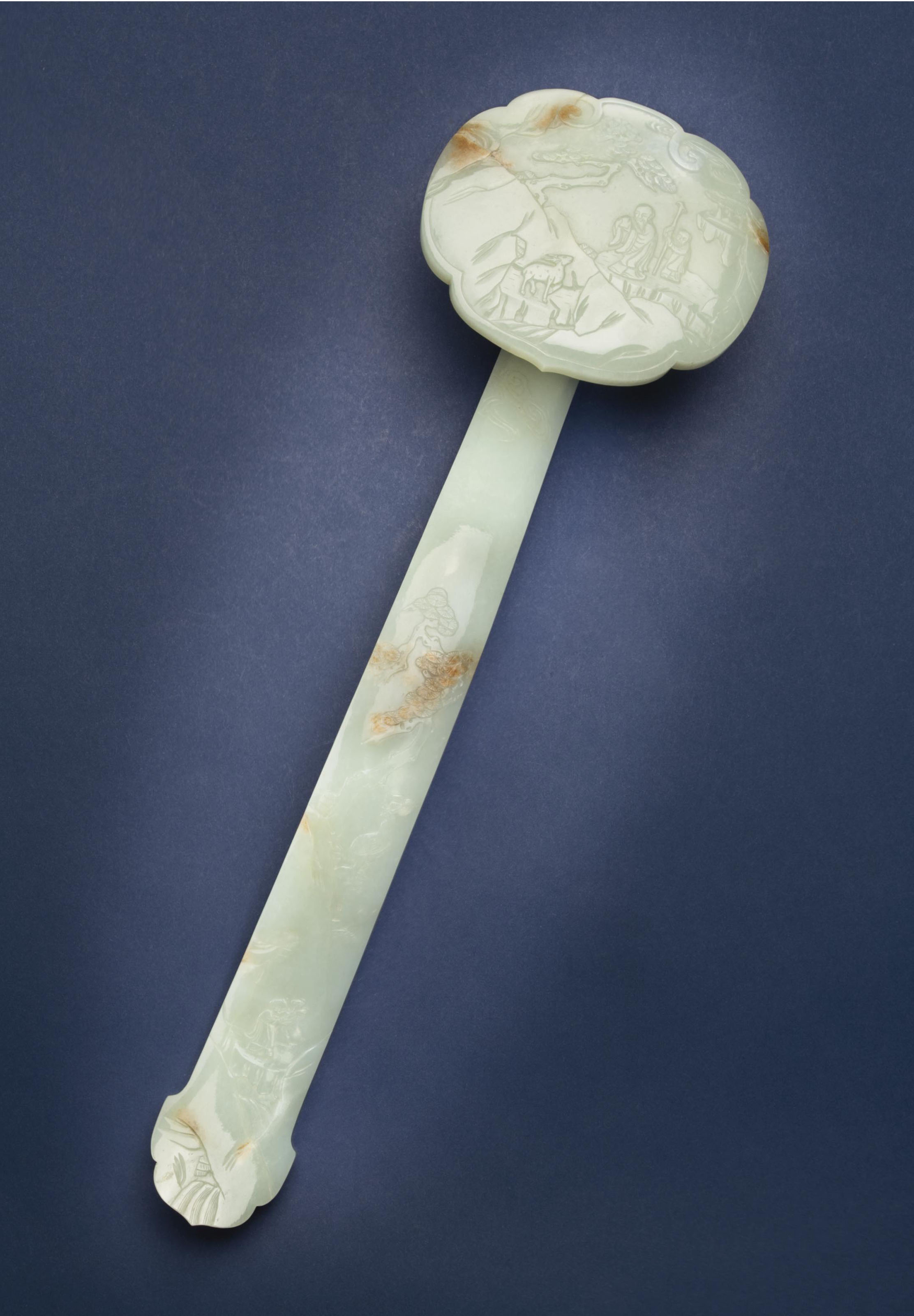 A PALE GREYISH-GREEN JADE RUYI SCEPTER