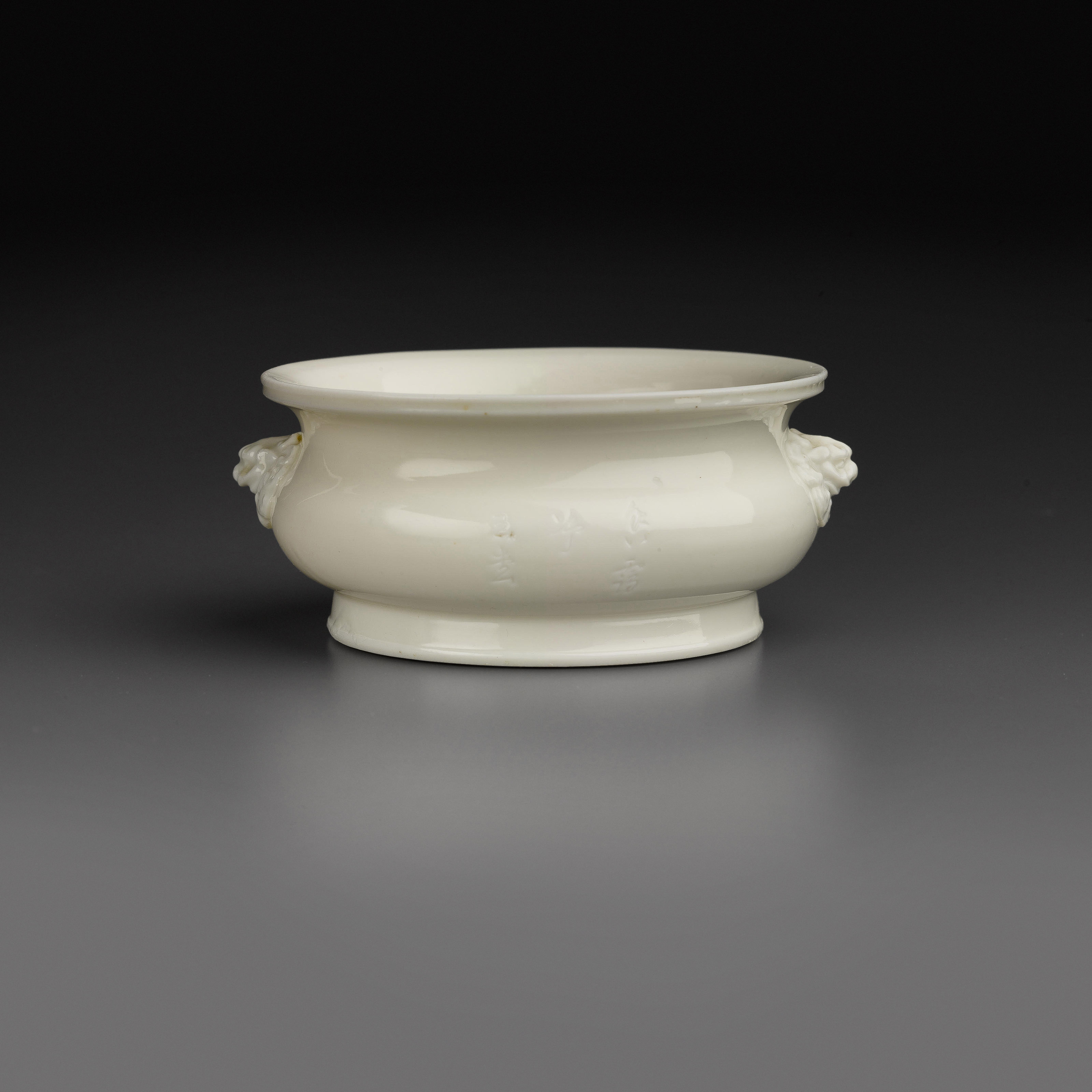 A DEHUA CENSER WITH MASK HANDLES, 17TH CENTURY | Christie’s