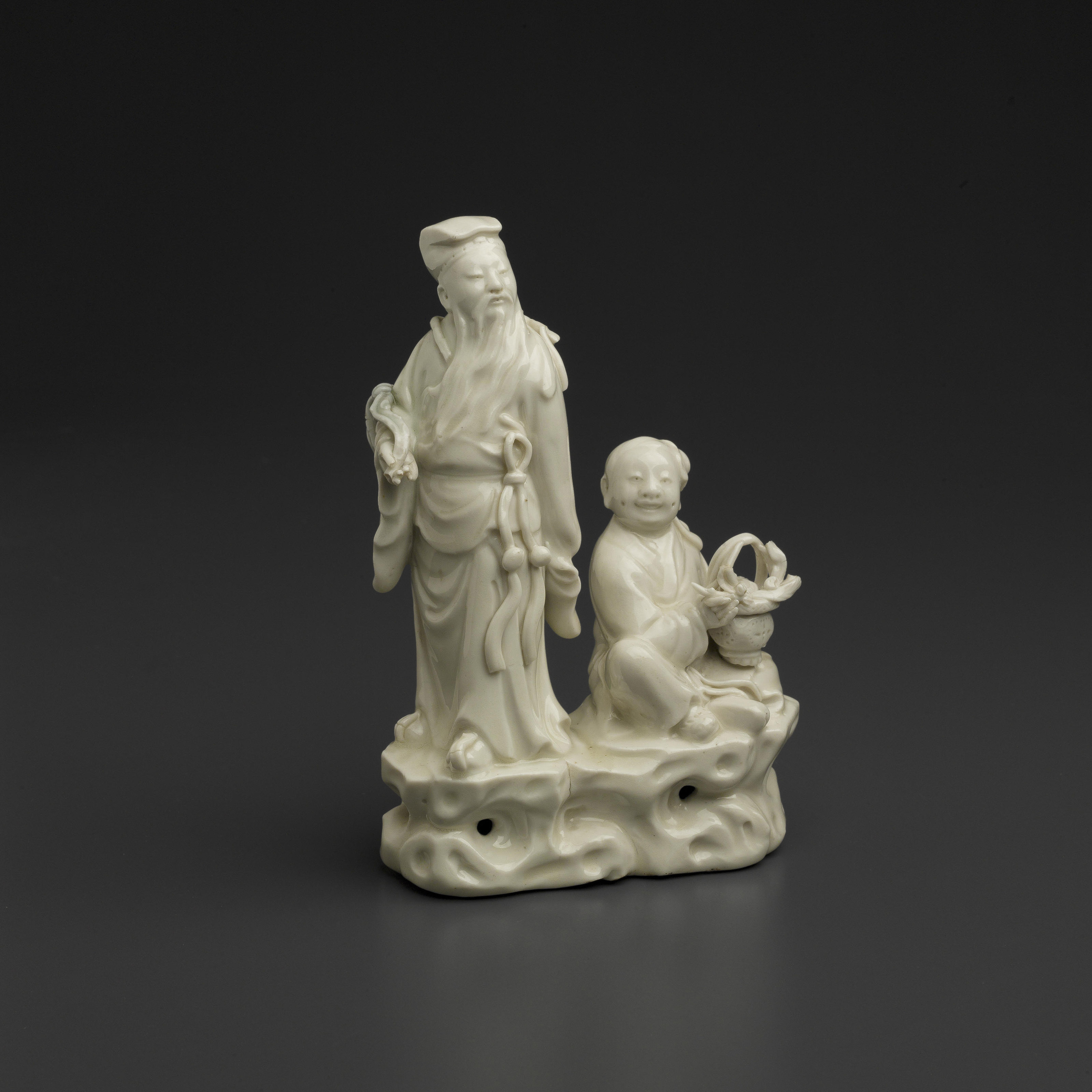 A DEHUA GROUP OF LU DONGBING AND ATTENDANT, 20TH CENTURY | Christie’s