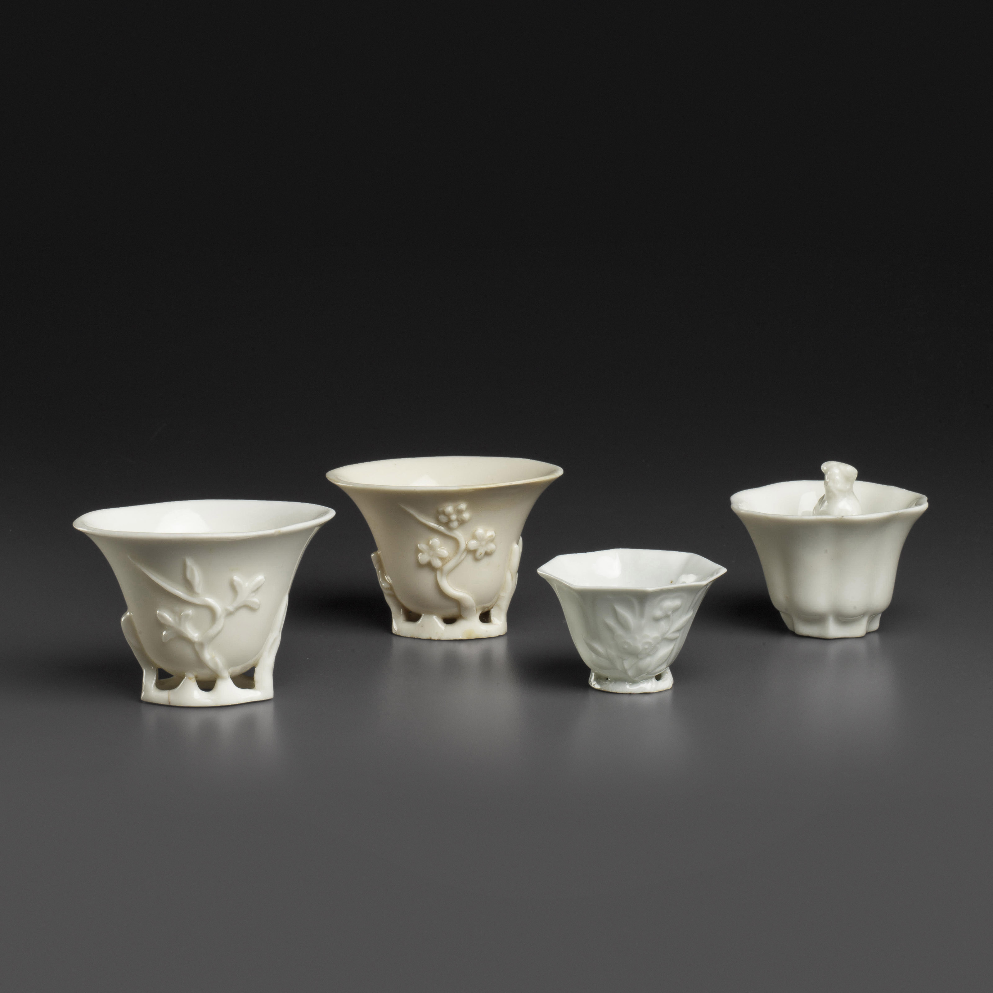 THREE DEHUA SMALL CUPS AND A 'TRICK' CUP, 17TH /18TH CENTURY | Christie’s